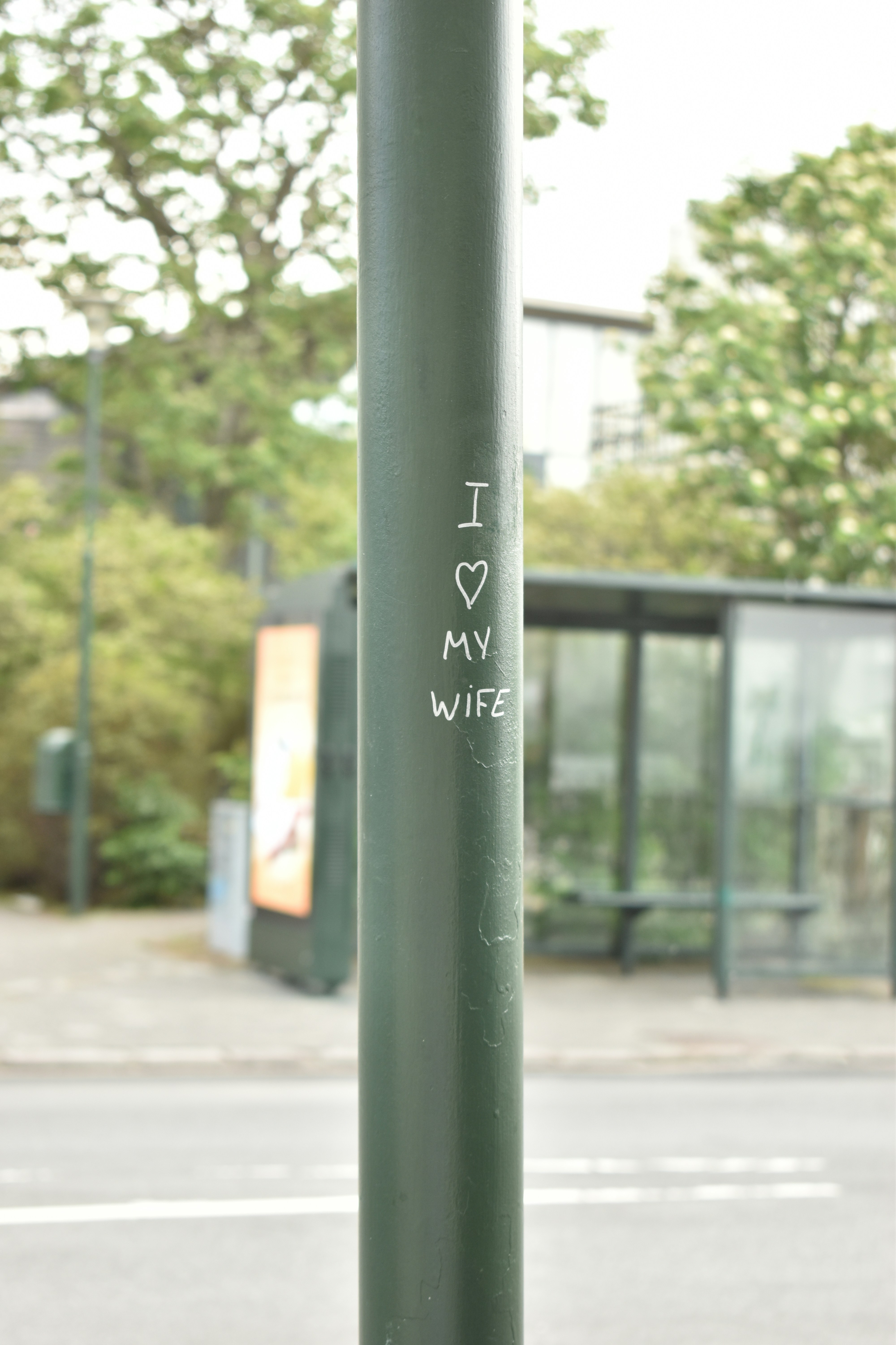 I Heart My Wife: A Quiet Urban Pole with Graffiti