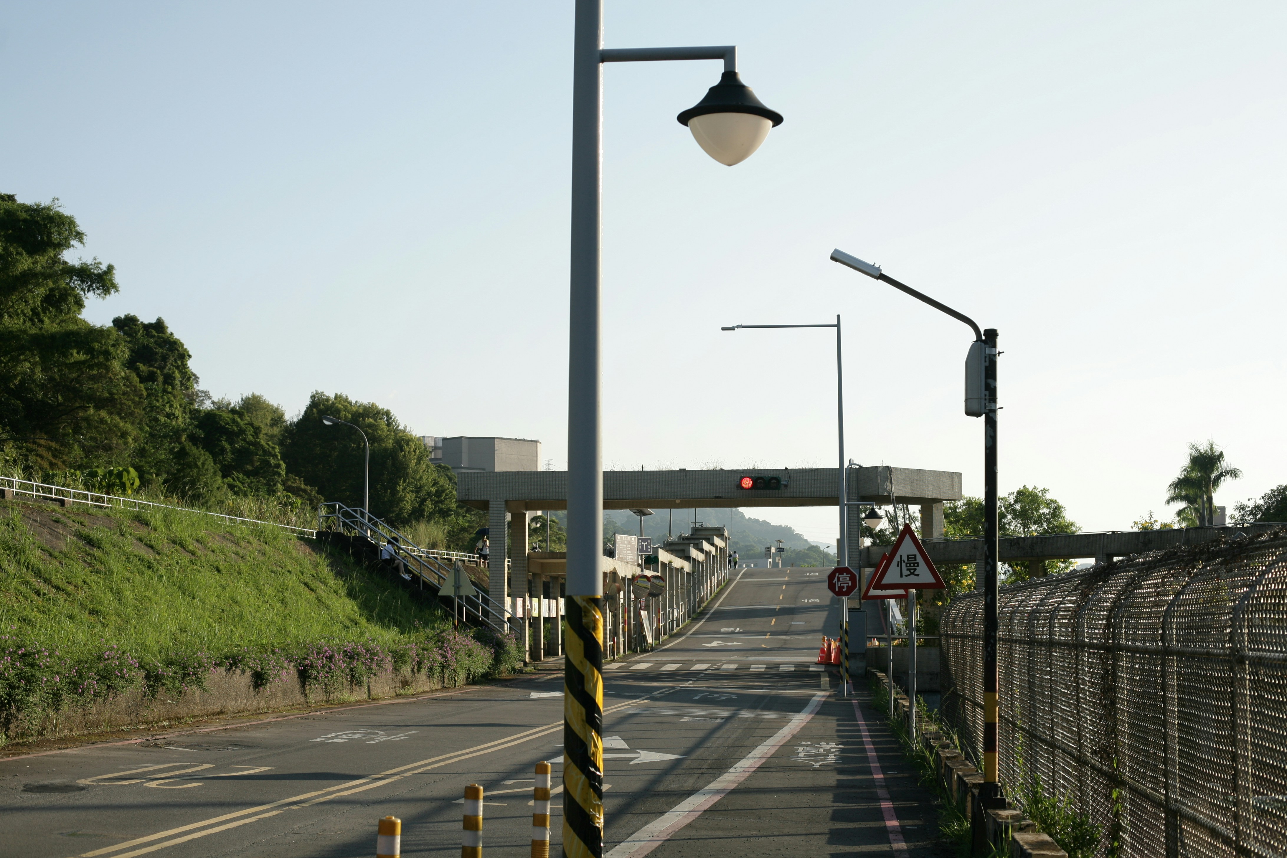 Vanishing Lines: Sunlit Corridor Toward an Overpass
