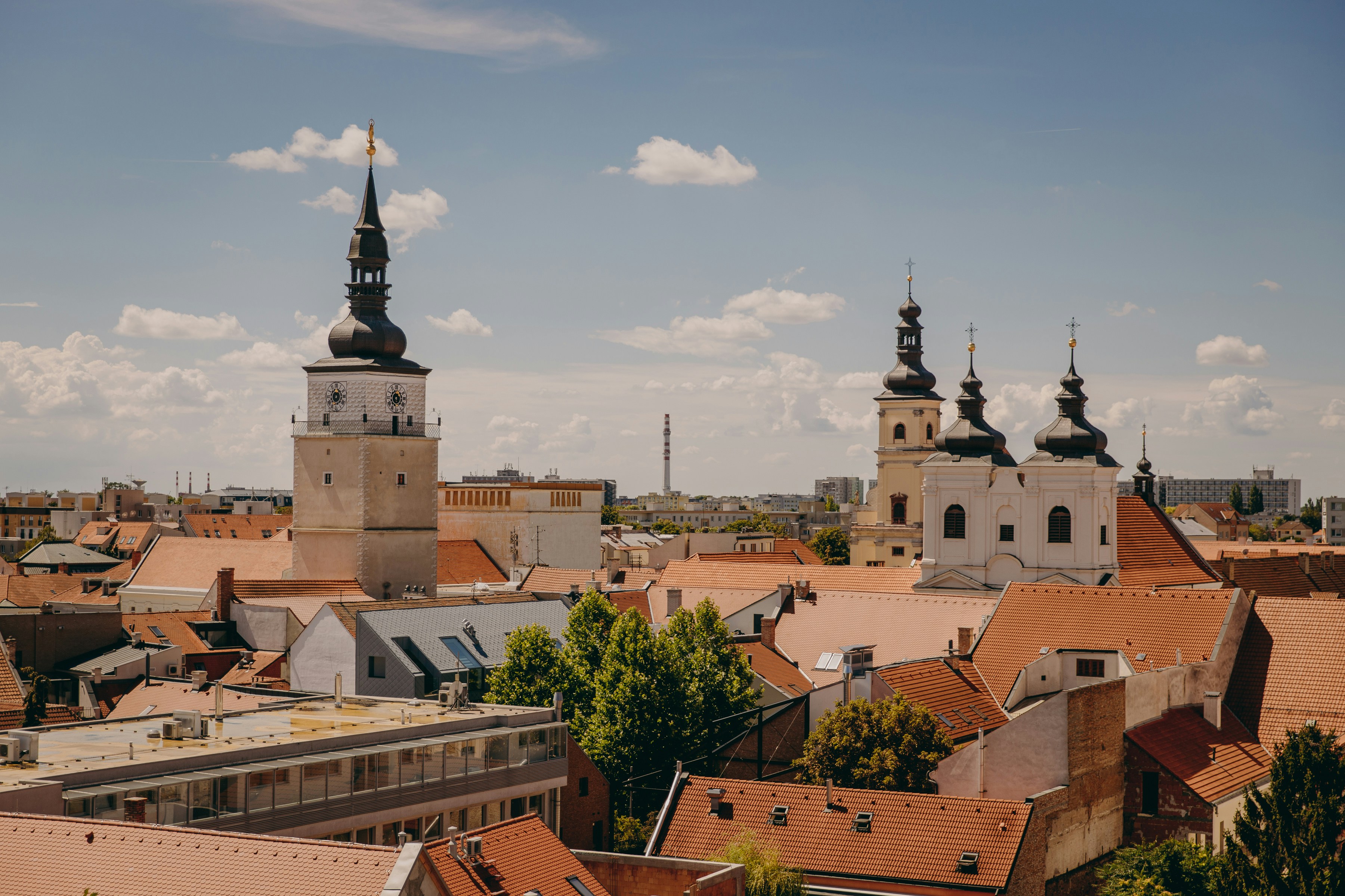 A city with many rooftops photo – Free Trnava Image on Unsplash