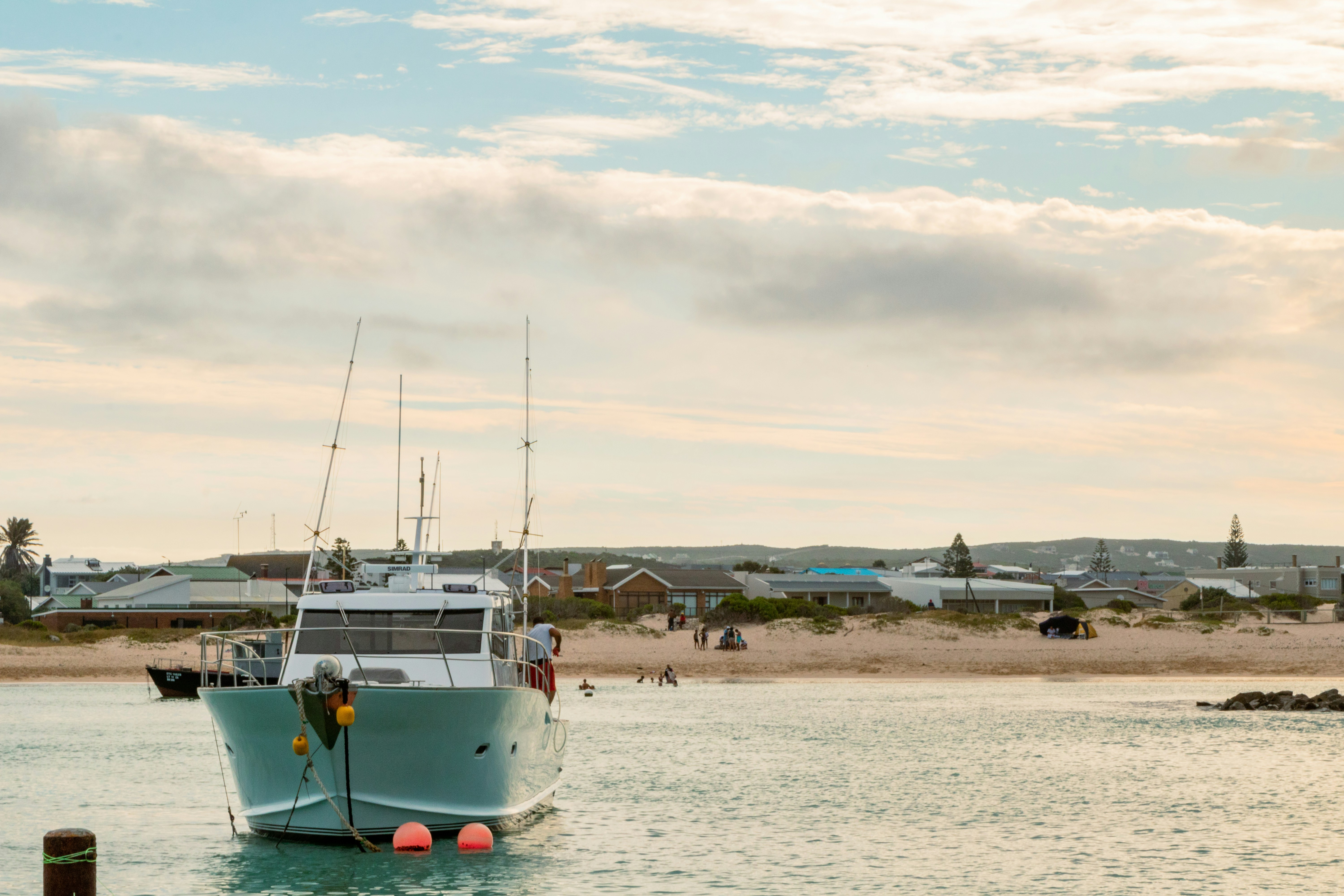 Harbor Vessel at Dusk: A Calm Coastal Moment