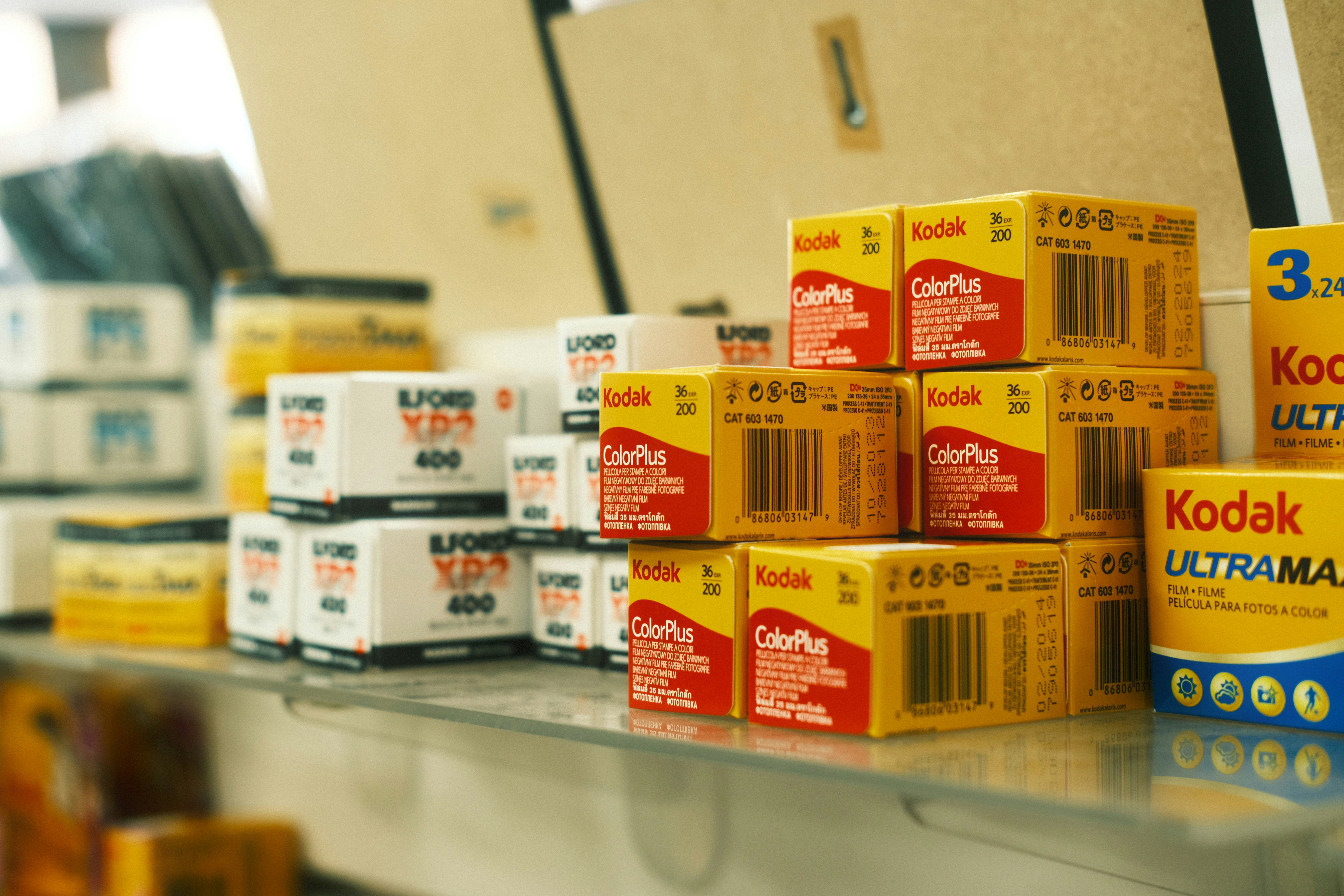Colorful Kodak Boxes Clustered on a Shelf