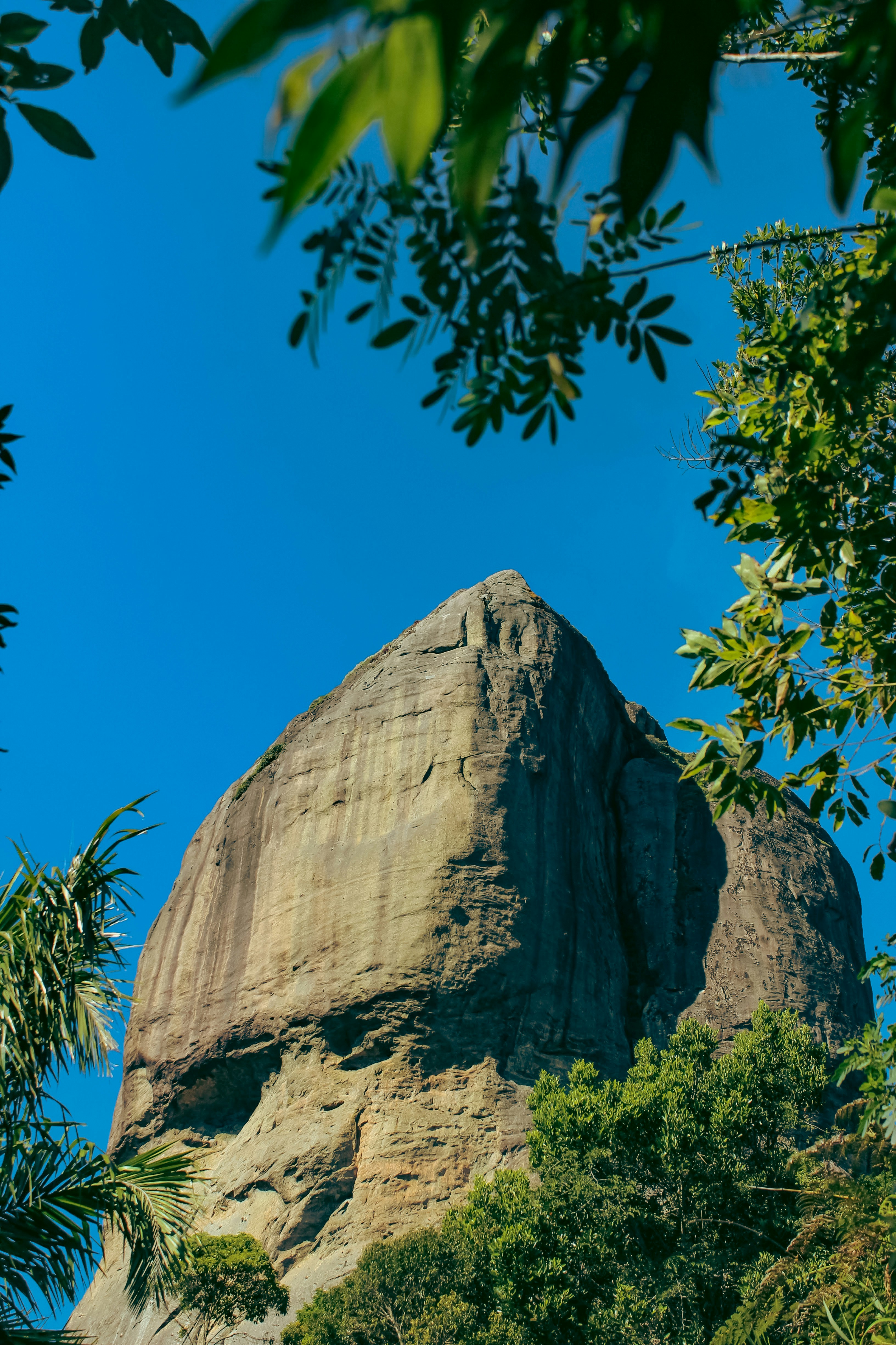 Granite Sentinel Rising Beneath a Clear Azure Sky