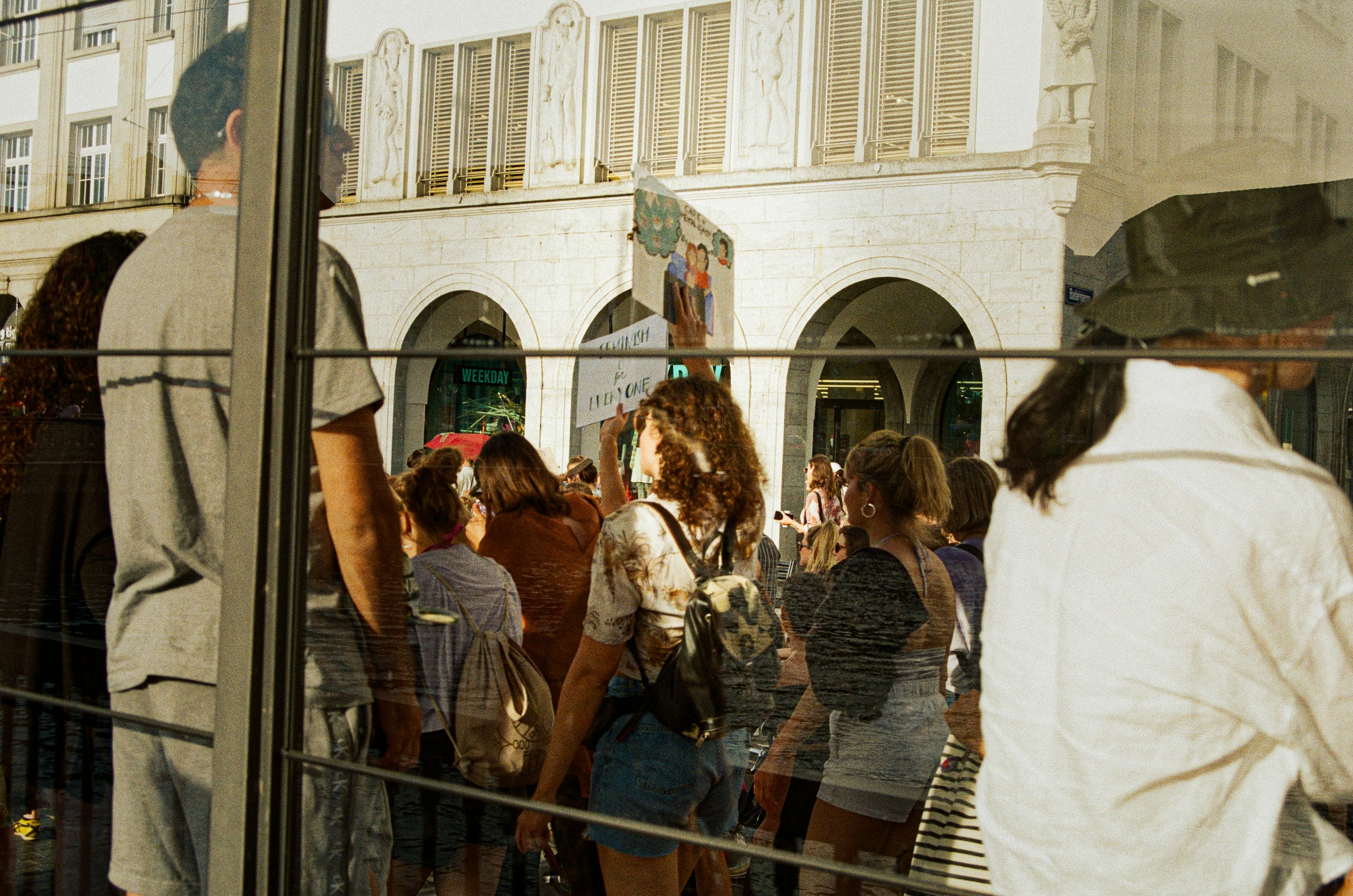 A group of people standing outside a building photo – Free Zürich Image ...