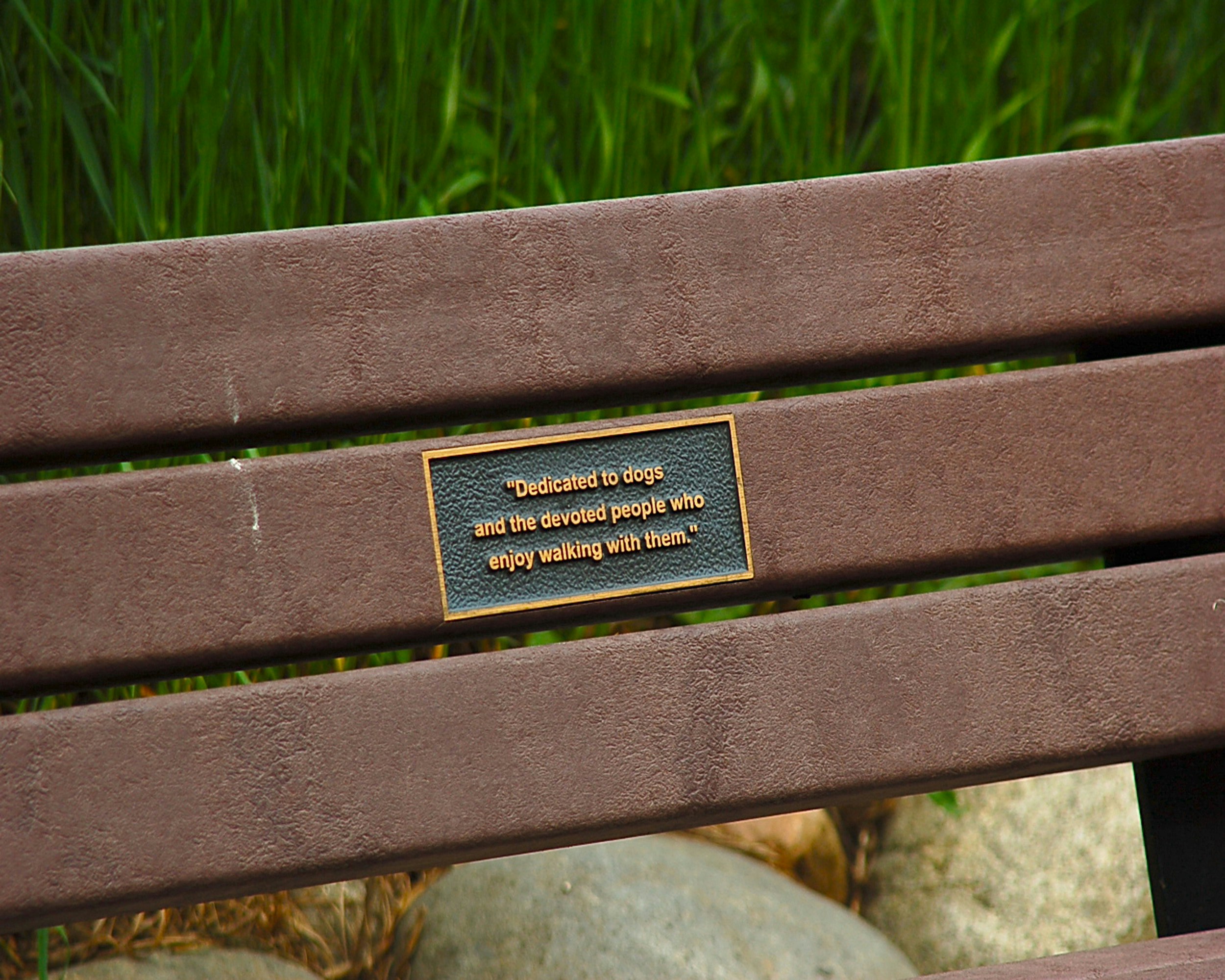 a sign on a bench