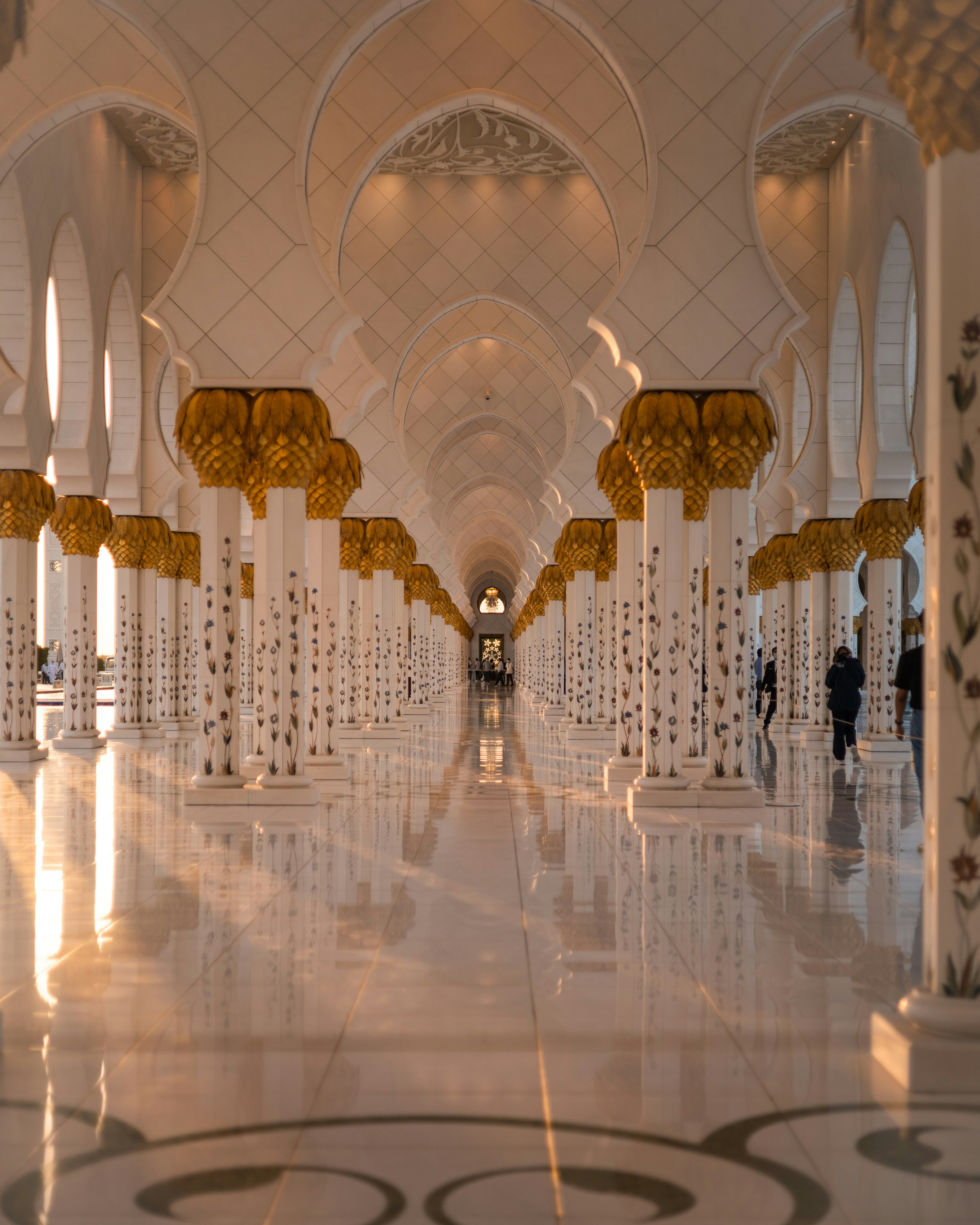A large ornate building with columns and arches photo – Free Abu dhabi ...