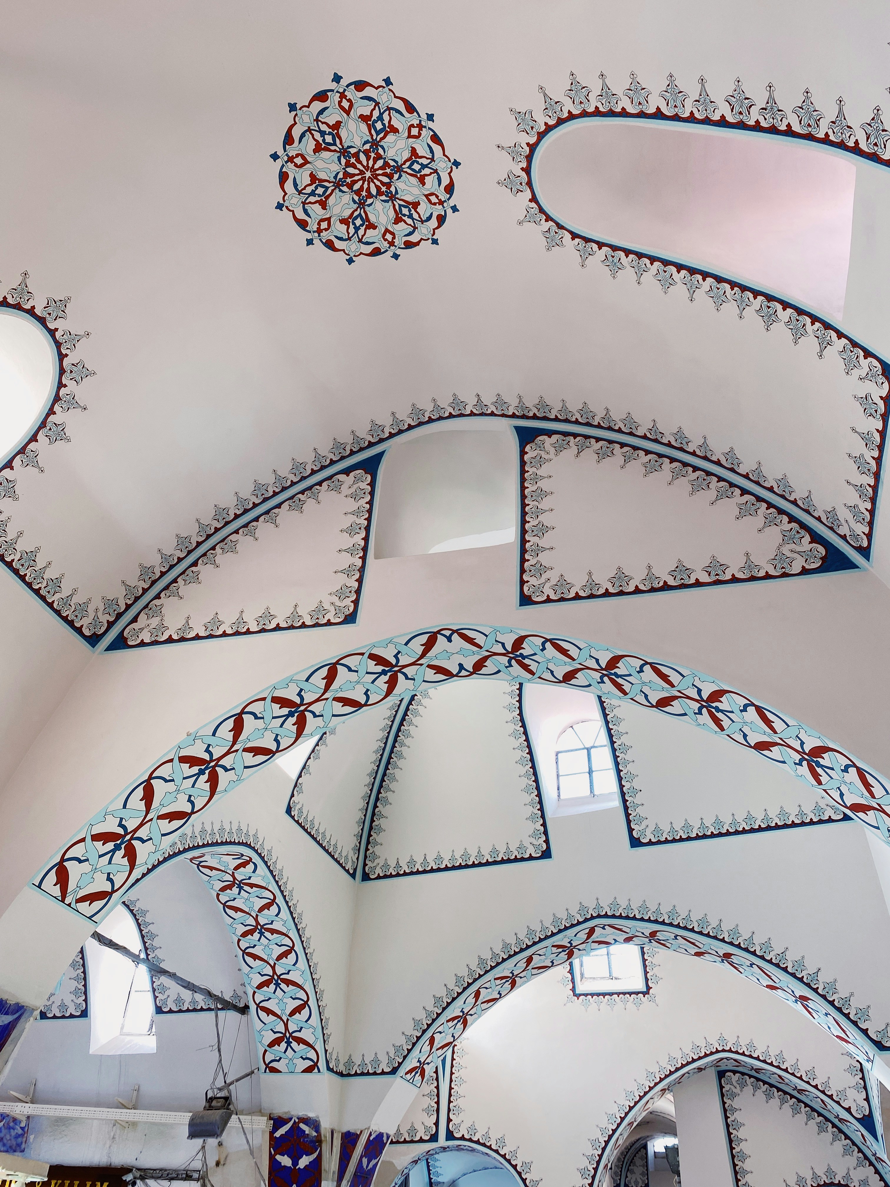 Vaulted Ecstasy: Arched Ceilings with Repeating Ornament in Soft Light