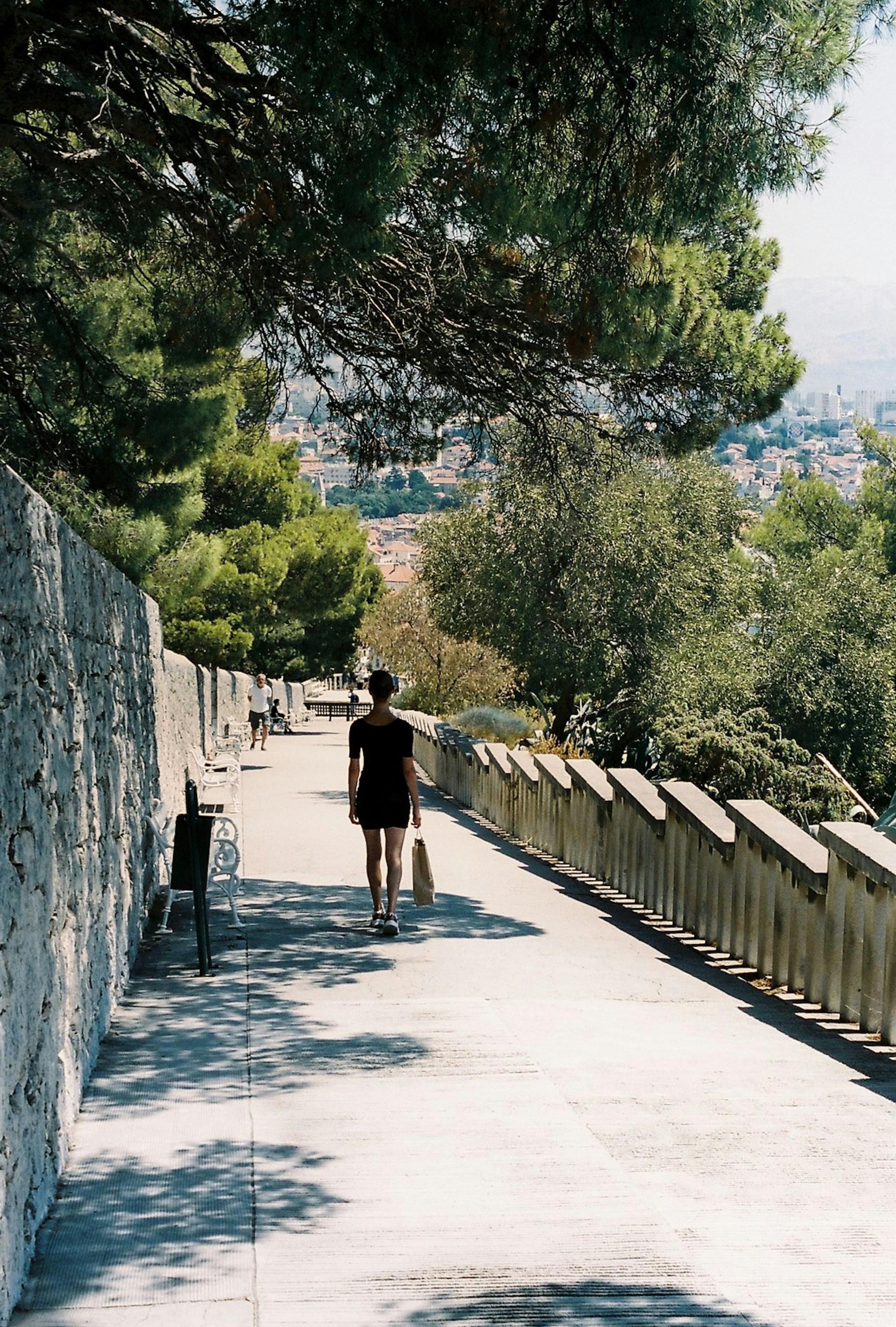 A person walking on a path photo – Free Human Image on Unsplash