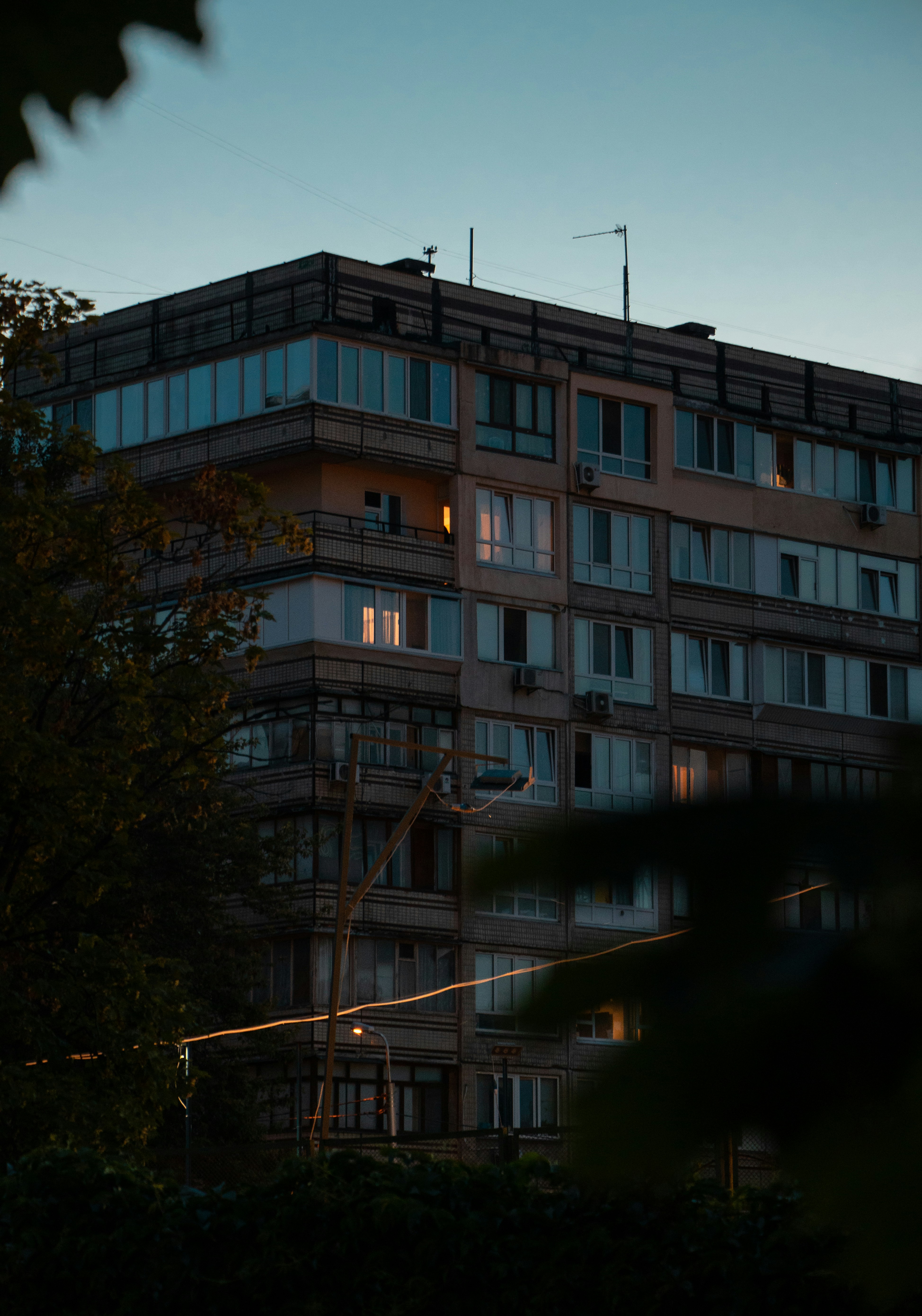 Photo of a residential building in one of the cozy Kyiv districts during the evening summer walk