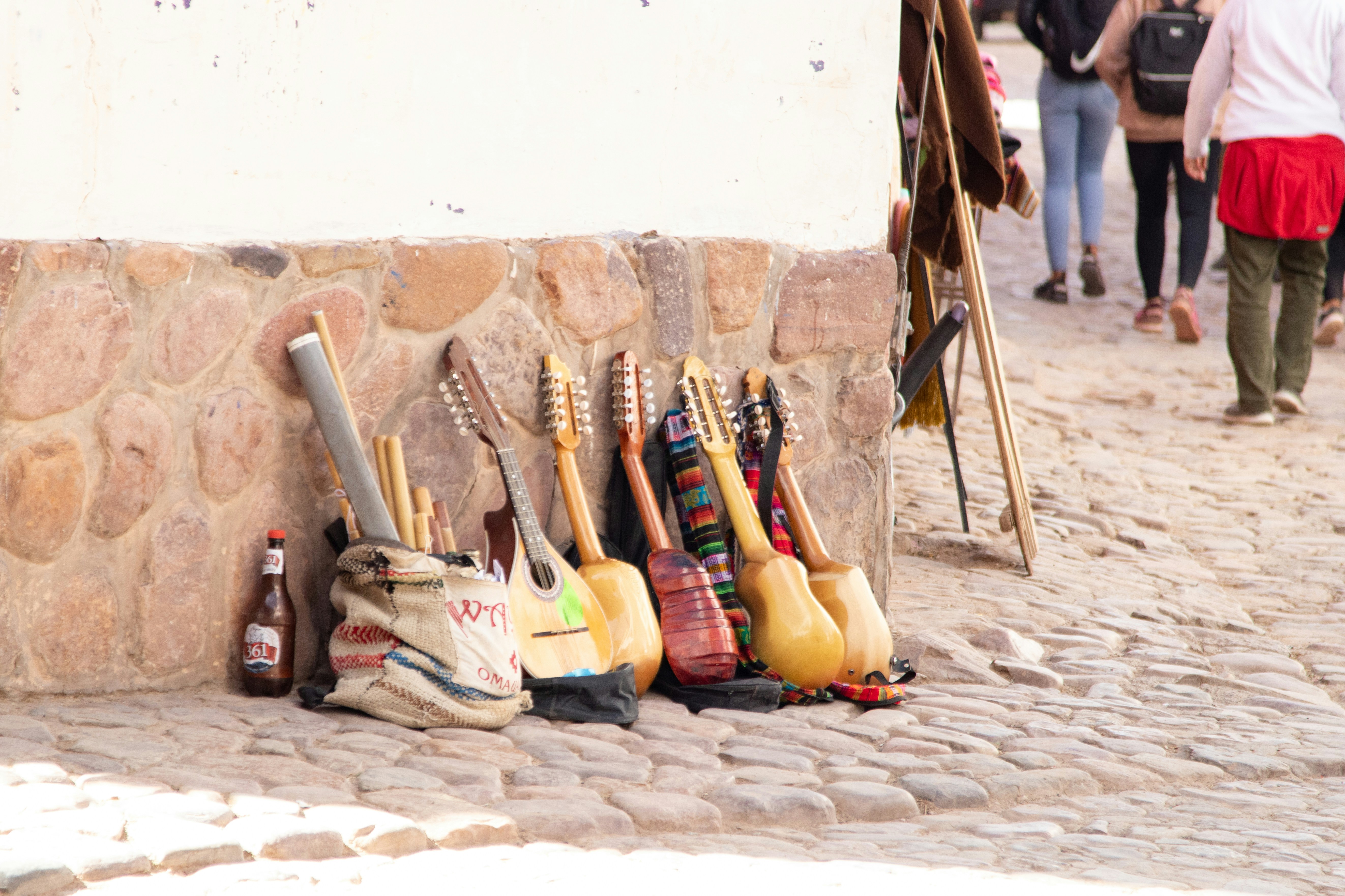 A group of people walking by a wall with food and drinks photo – Free ...