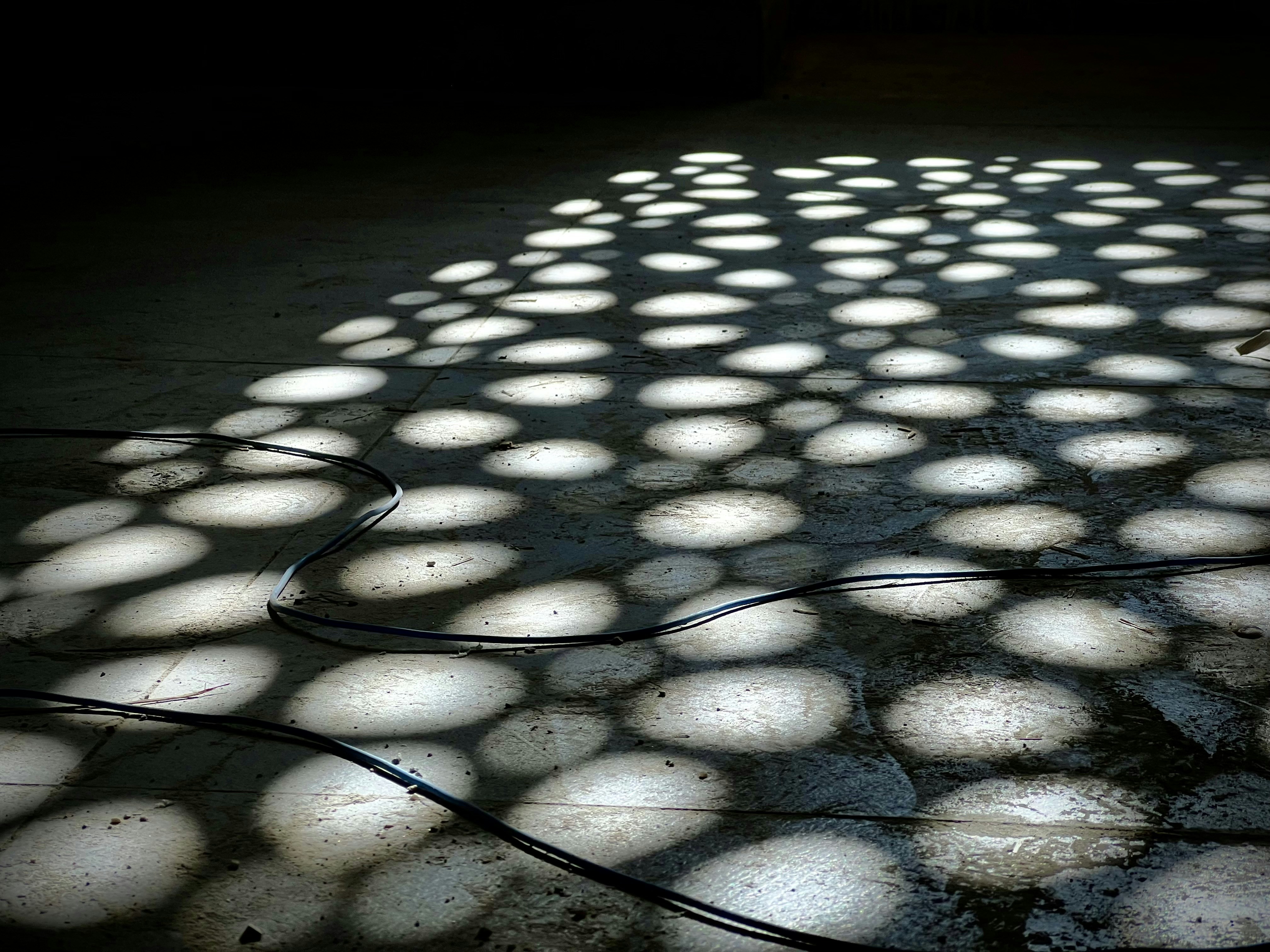 Moonlit Orbs on a Deserted Floor