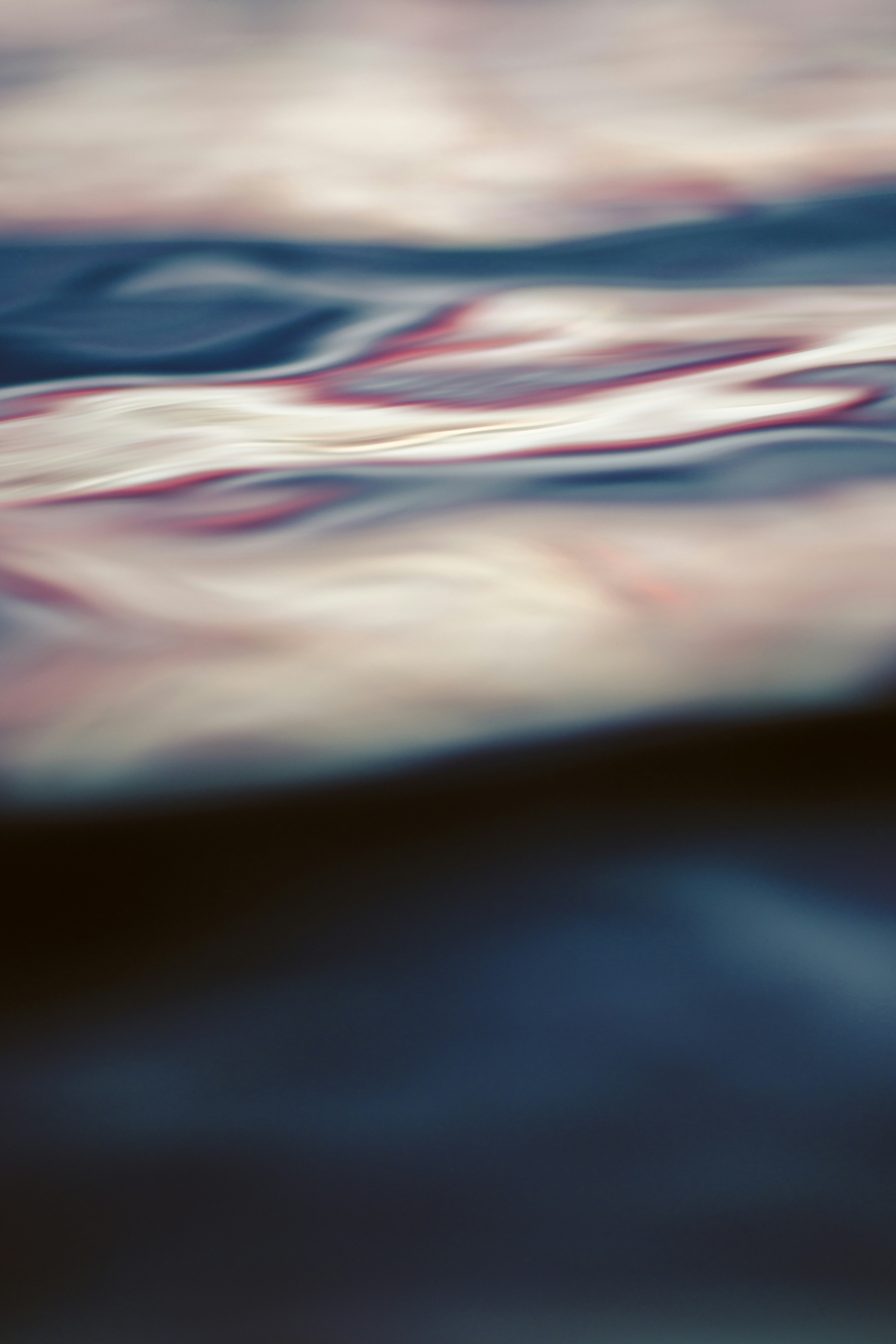 a close up of a blue and white striped surface