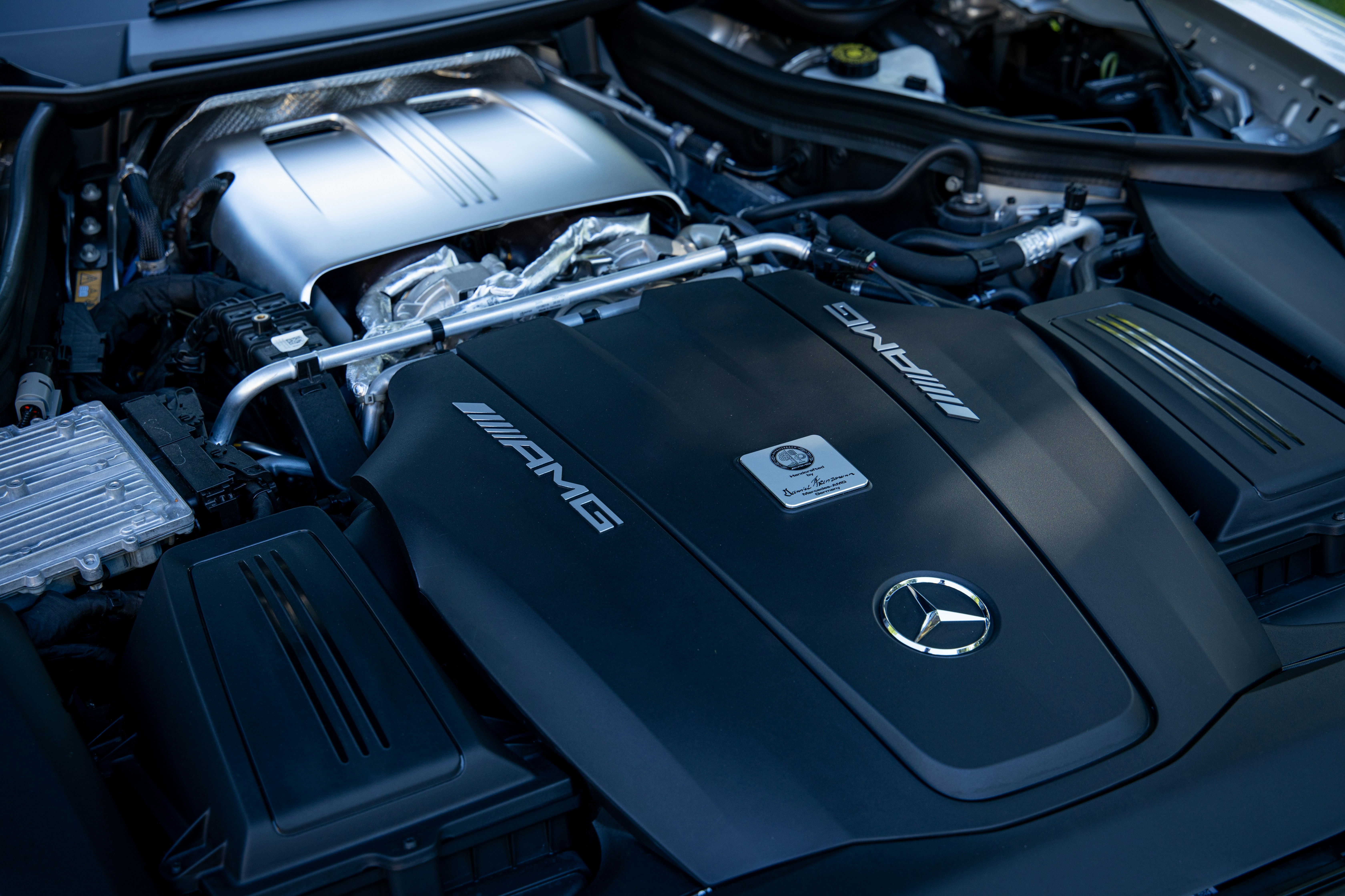 A black car engine photo – Free Car engine Image on Unsplash