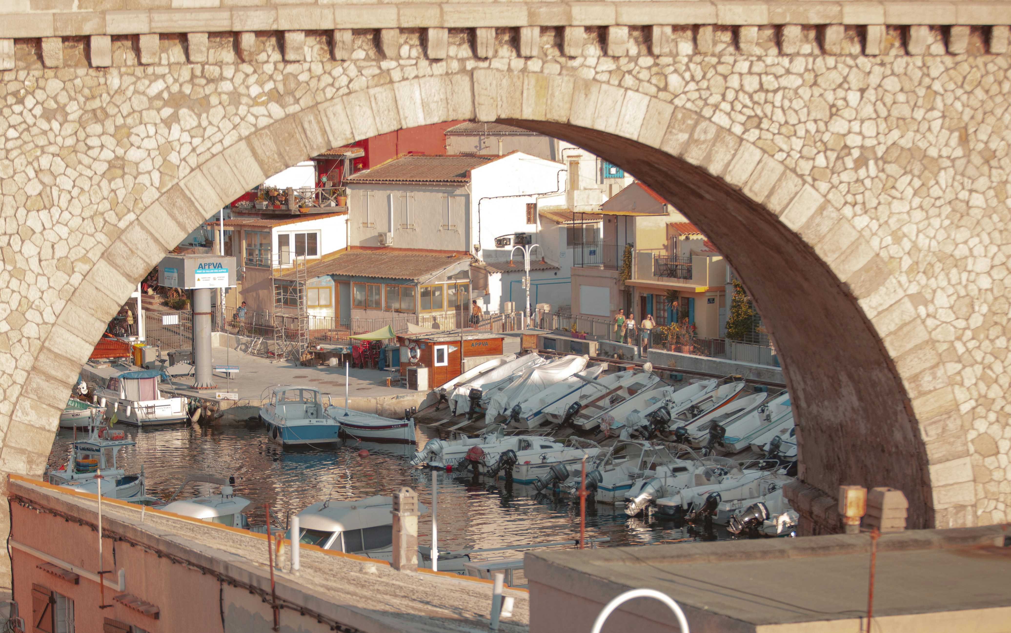 A bridge with boats and buildings photo – Free Marseille Image on Unsplash