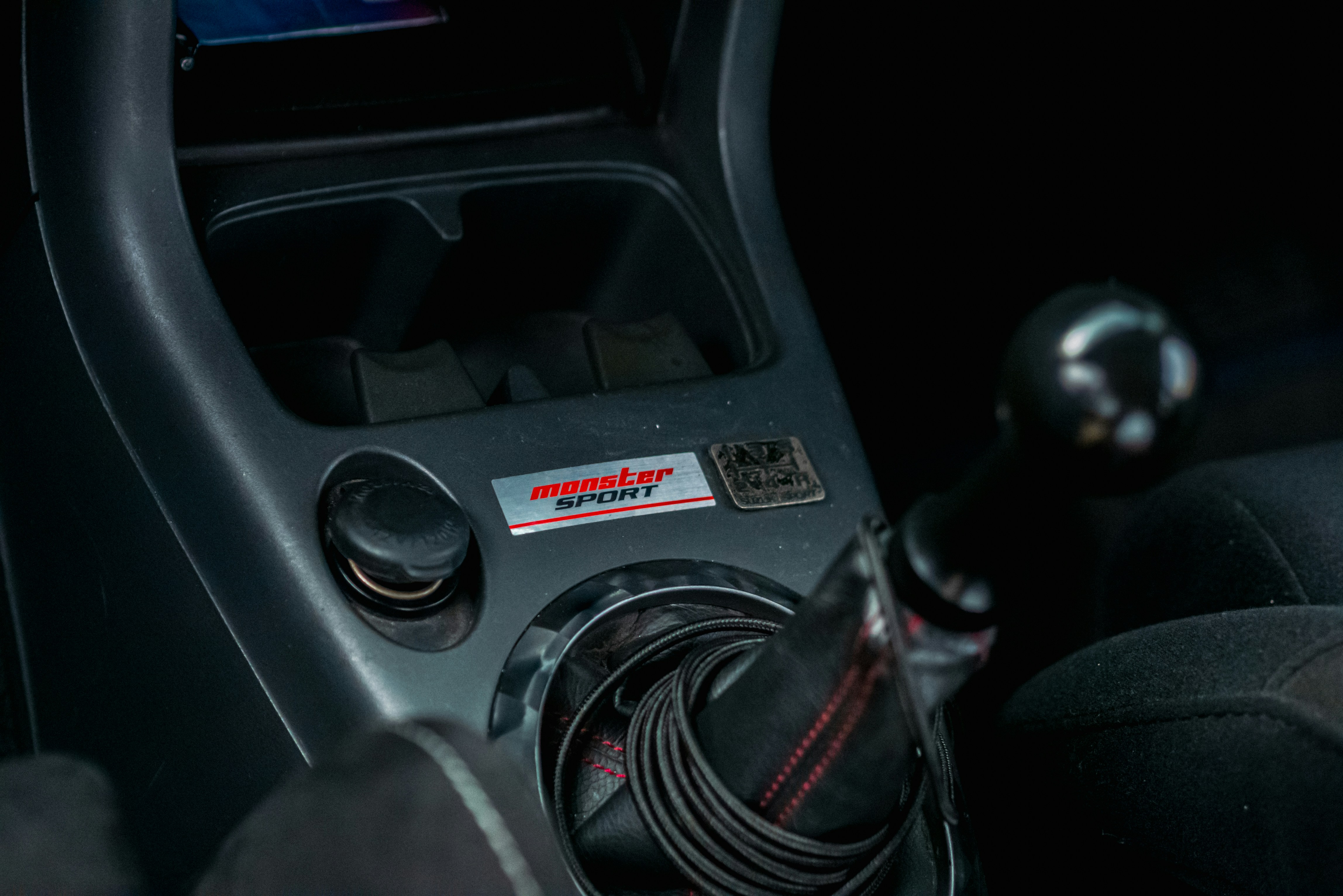 Center-Console Focus: a Close-Up on the Sporty Gearknob and Red-Stitched Detail