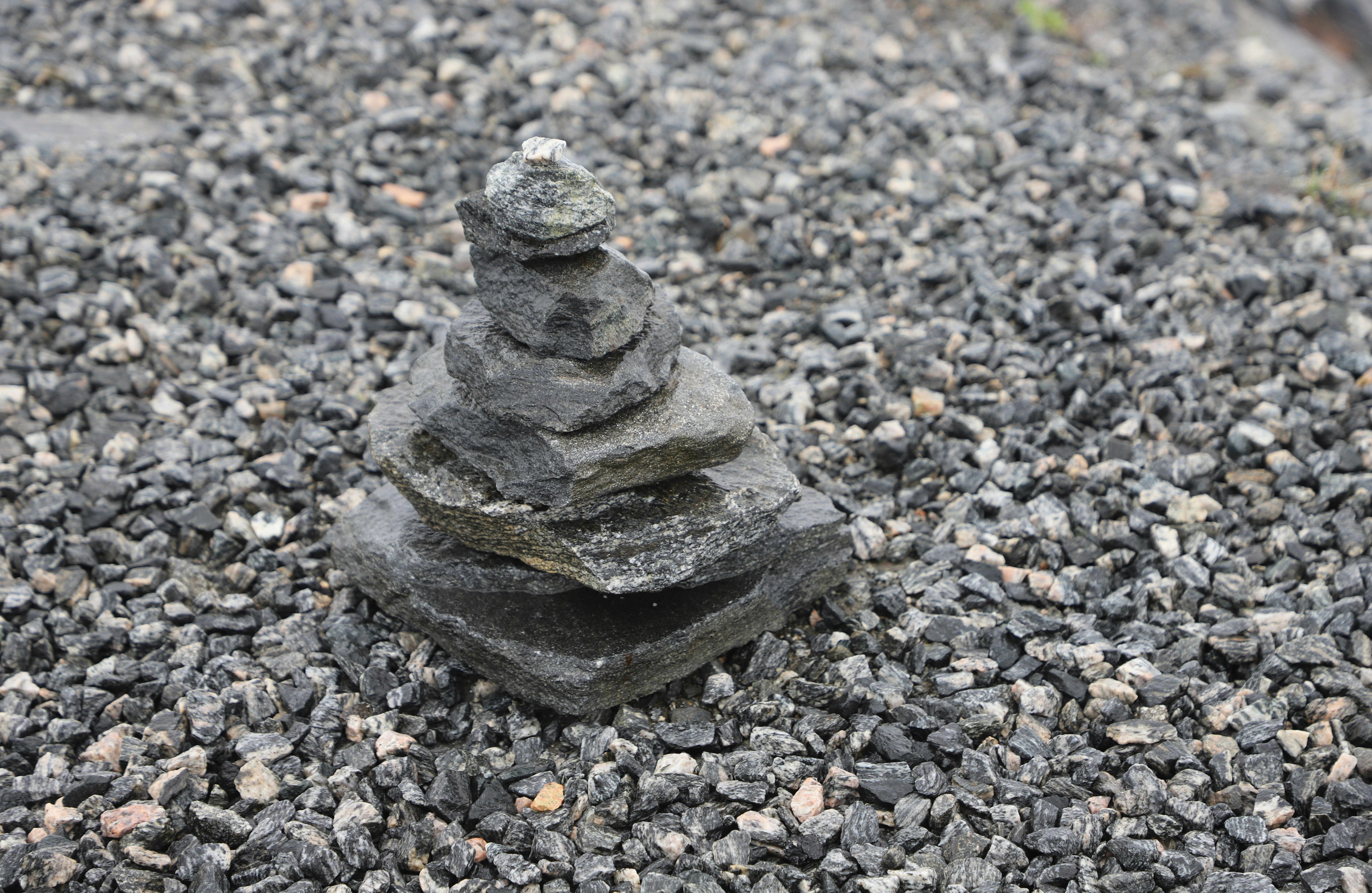Stone Stack on a Gravel Bed: Quiet Ritual in Gray Tones