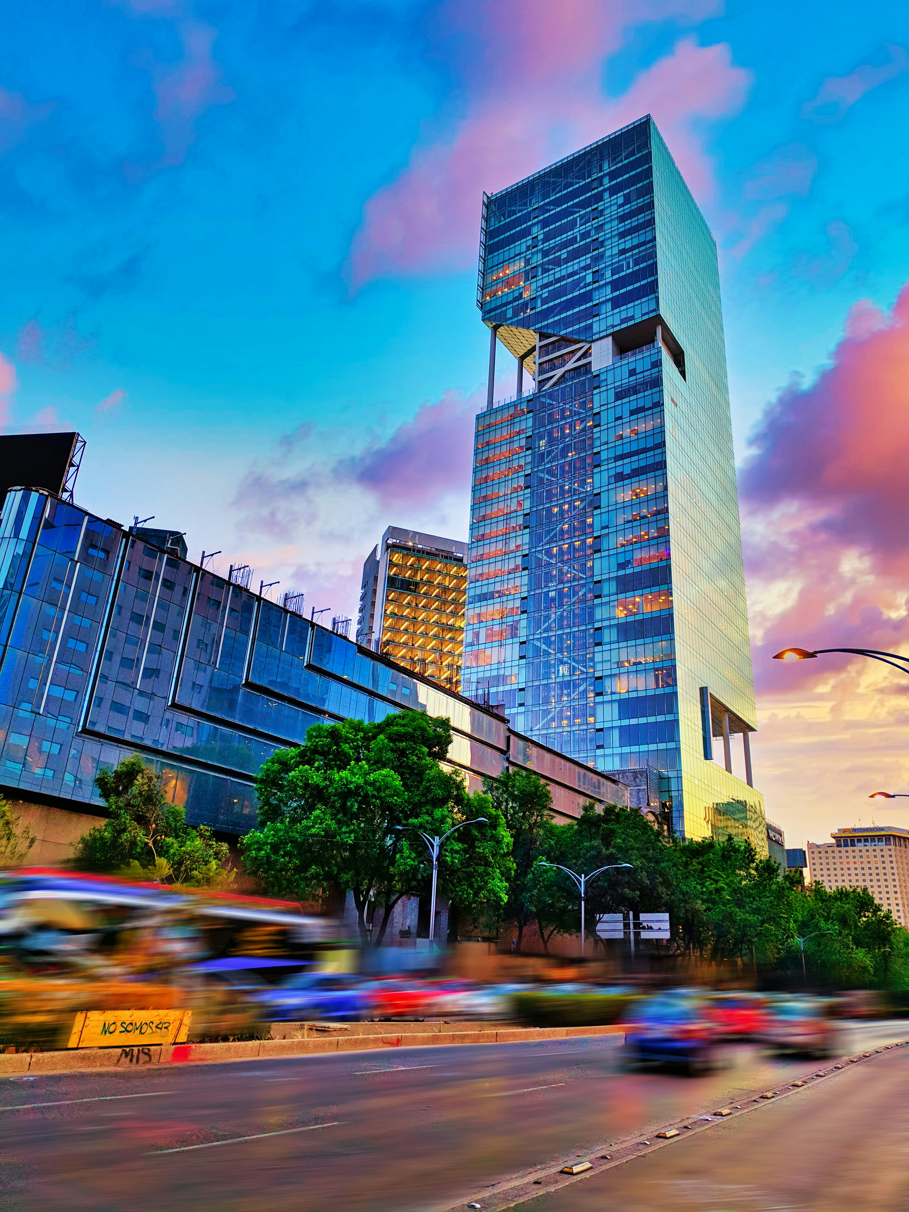 A large building with a lot of windows photo – Free Office building ...