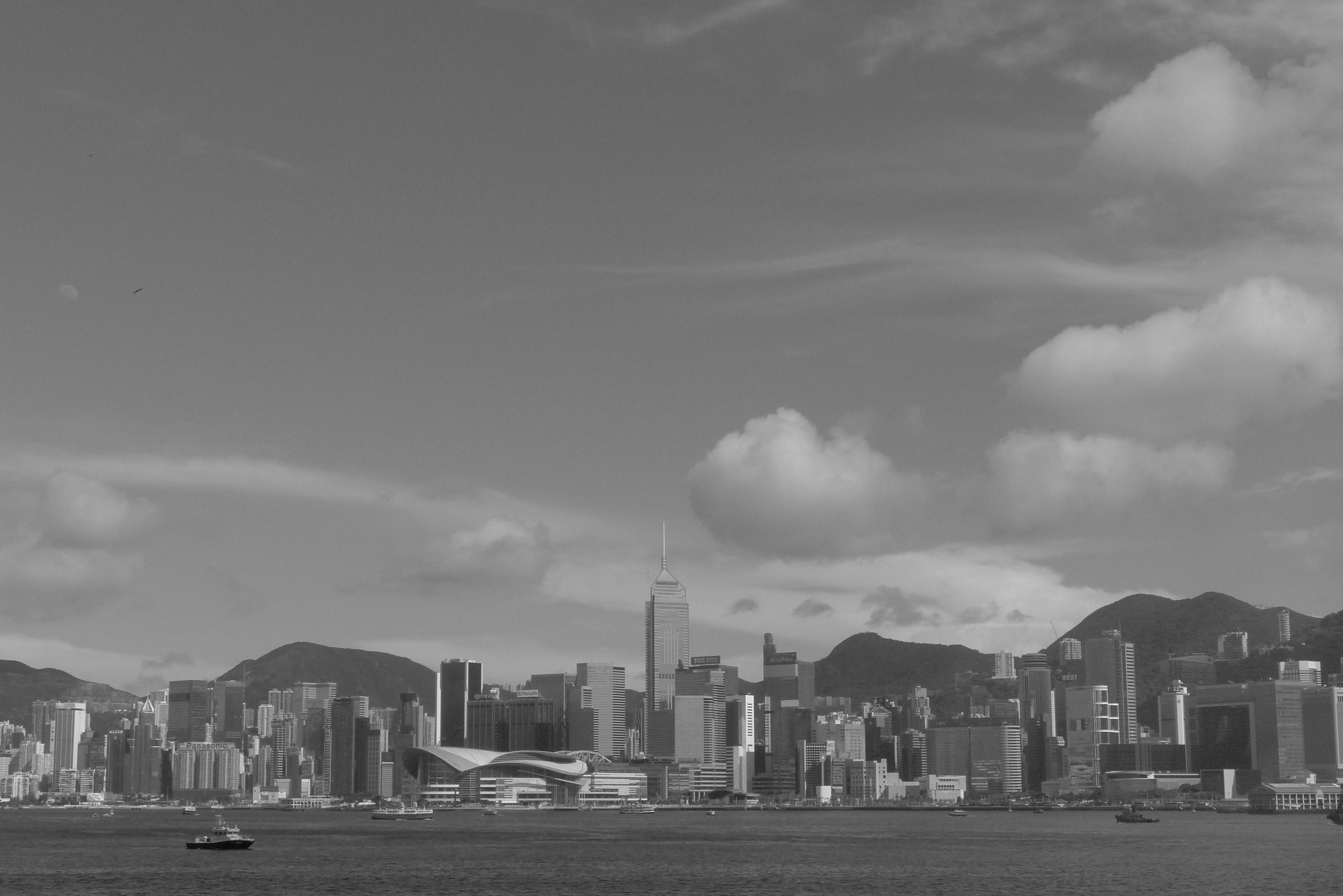 Monochrome Harbor Skyline: Steel and Cloud Above the Bay