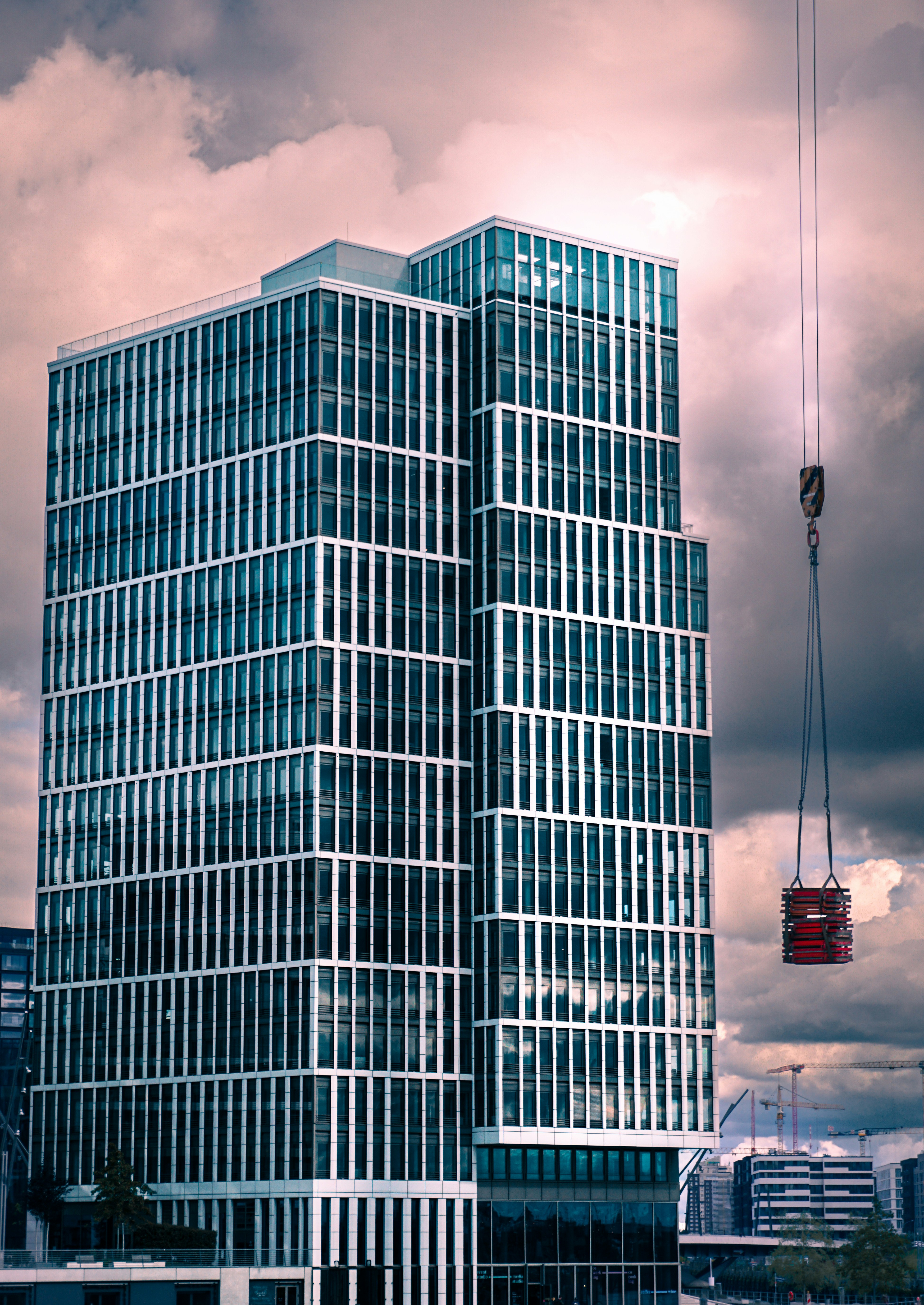 a tall building with a cable car