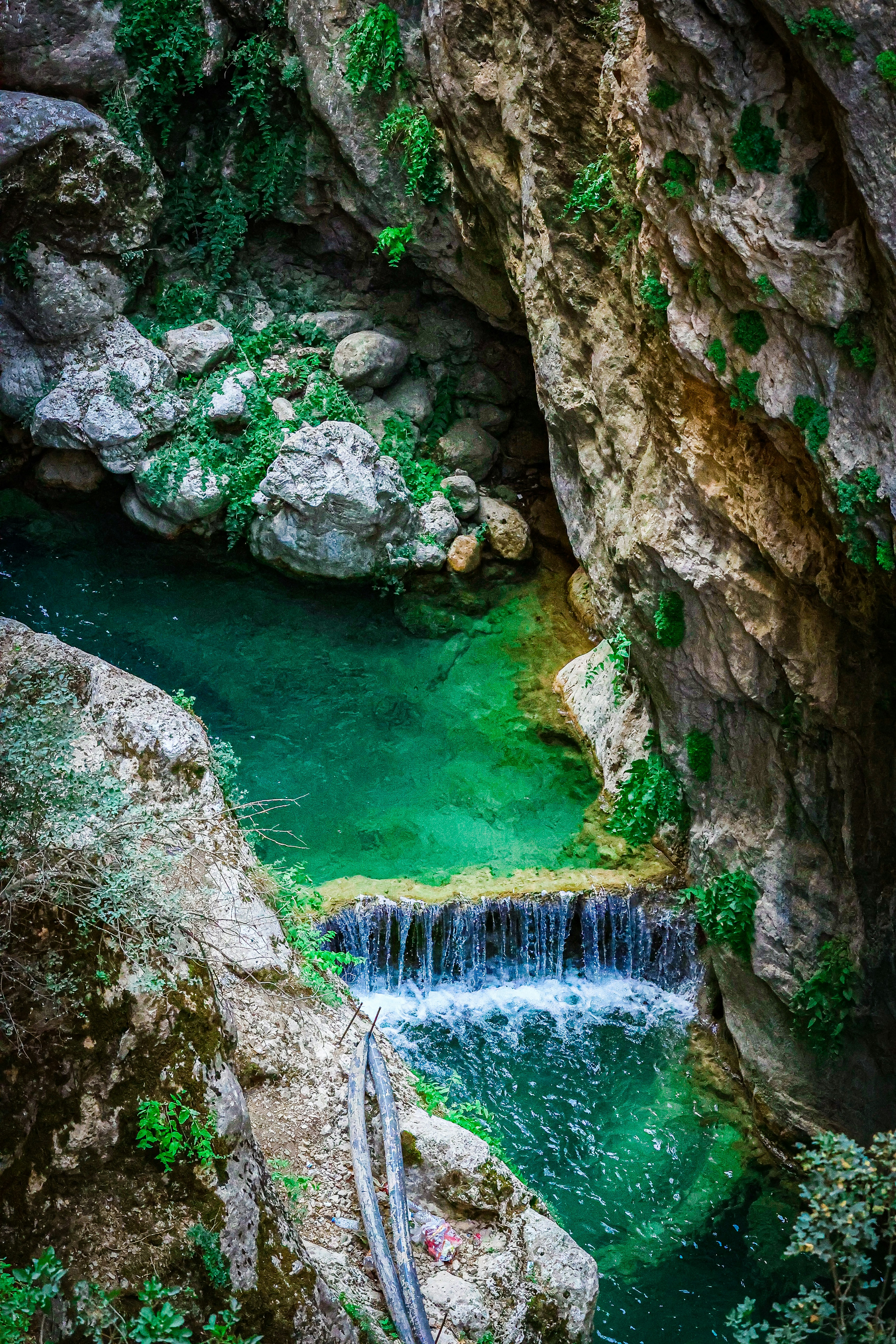 A waterfall in a rocky area photo – Free Iraq Image on Unsplash