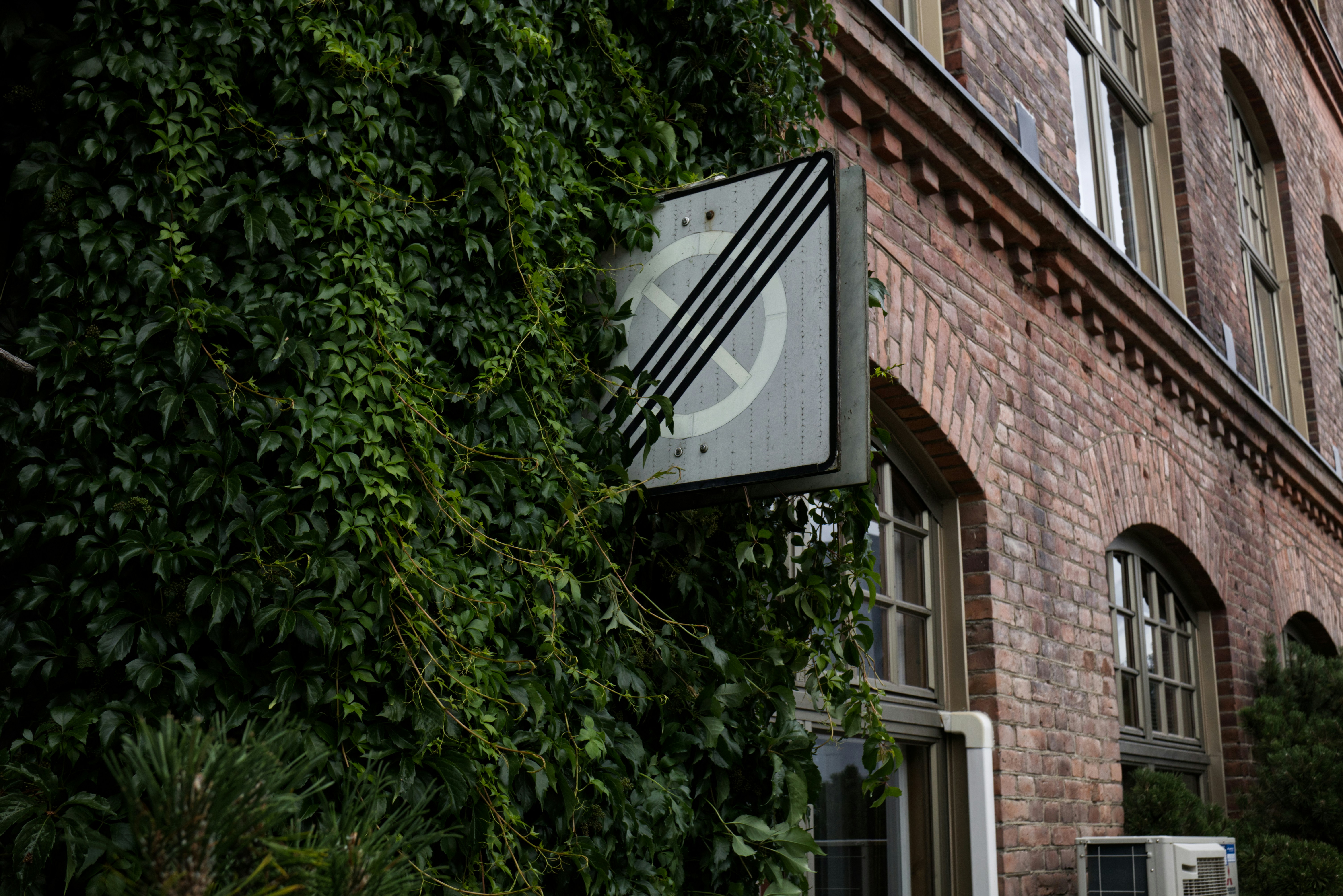 a clock on a brick building
