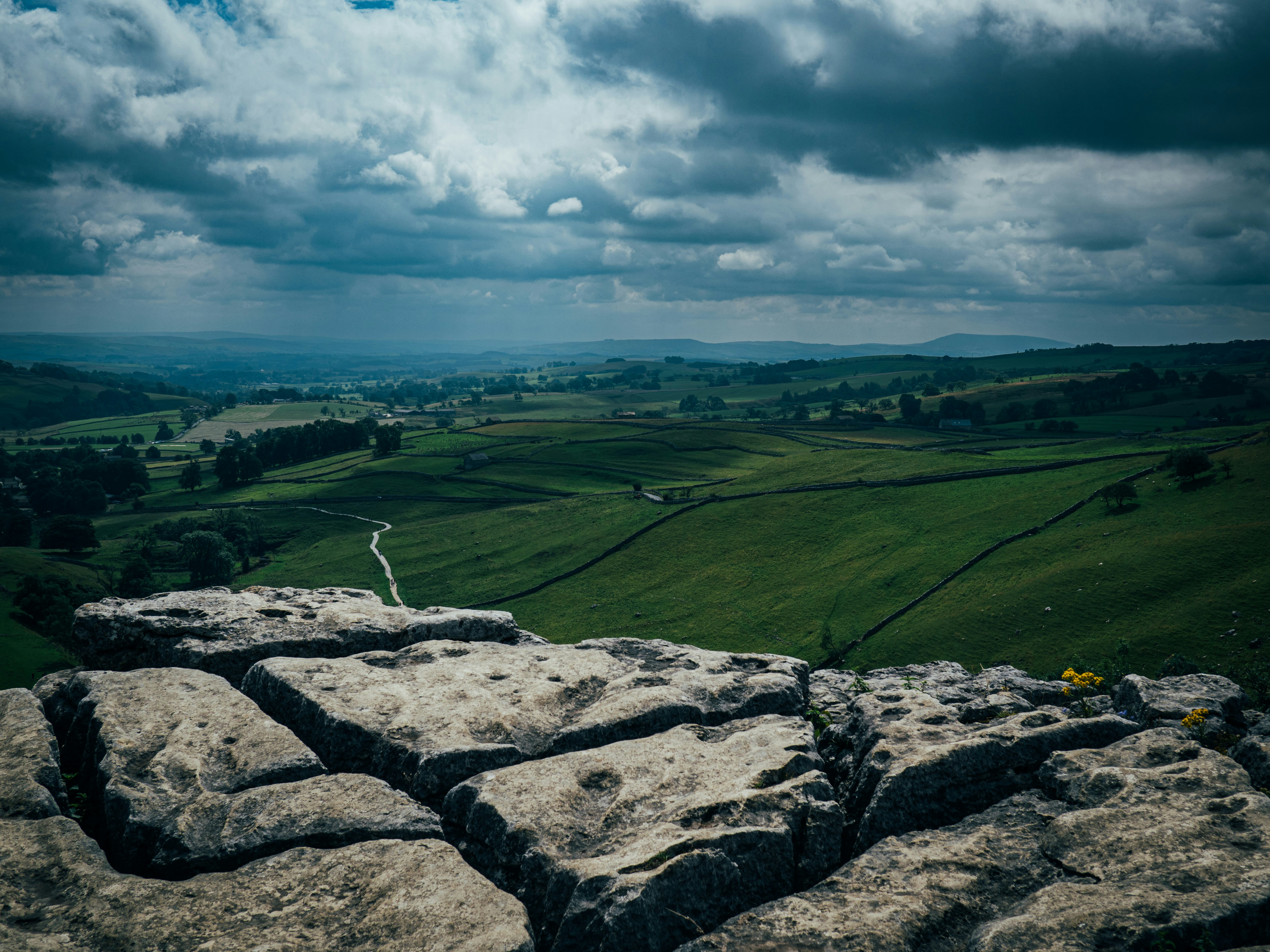 A view of a large rock photo – Free Malham cove Image on Unsplash