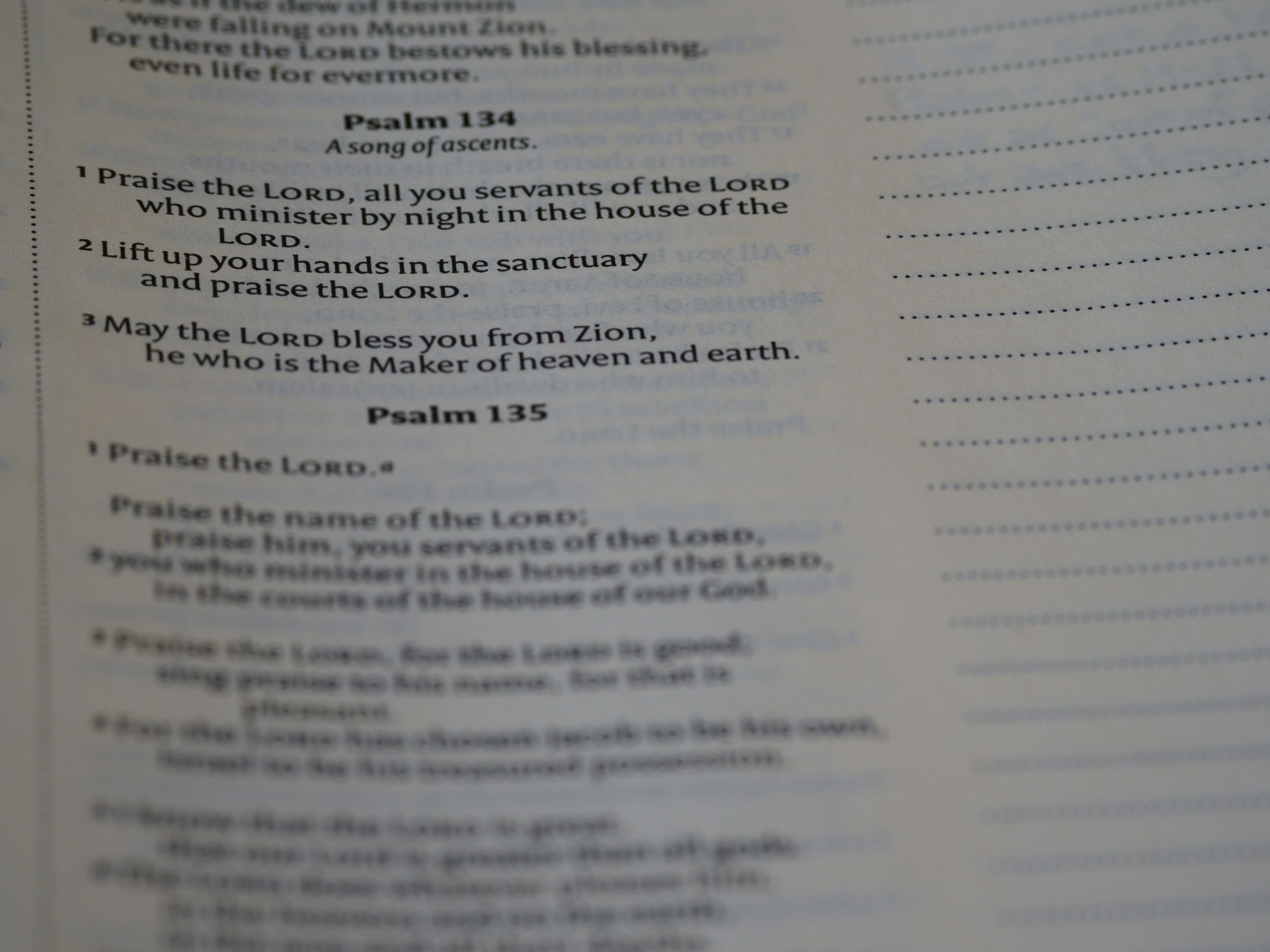 Two Columns, One Moment: Close-up of Psalms 134-135 on a printed Bible page