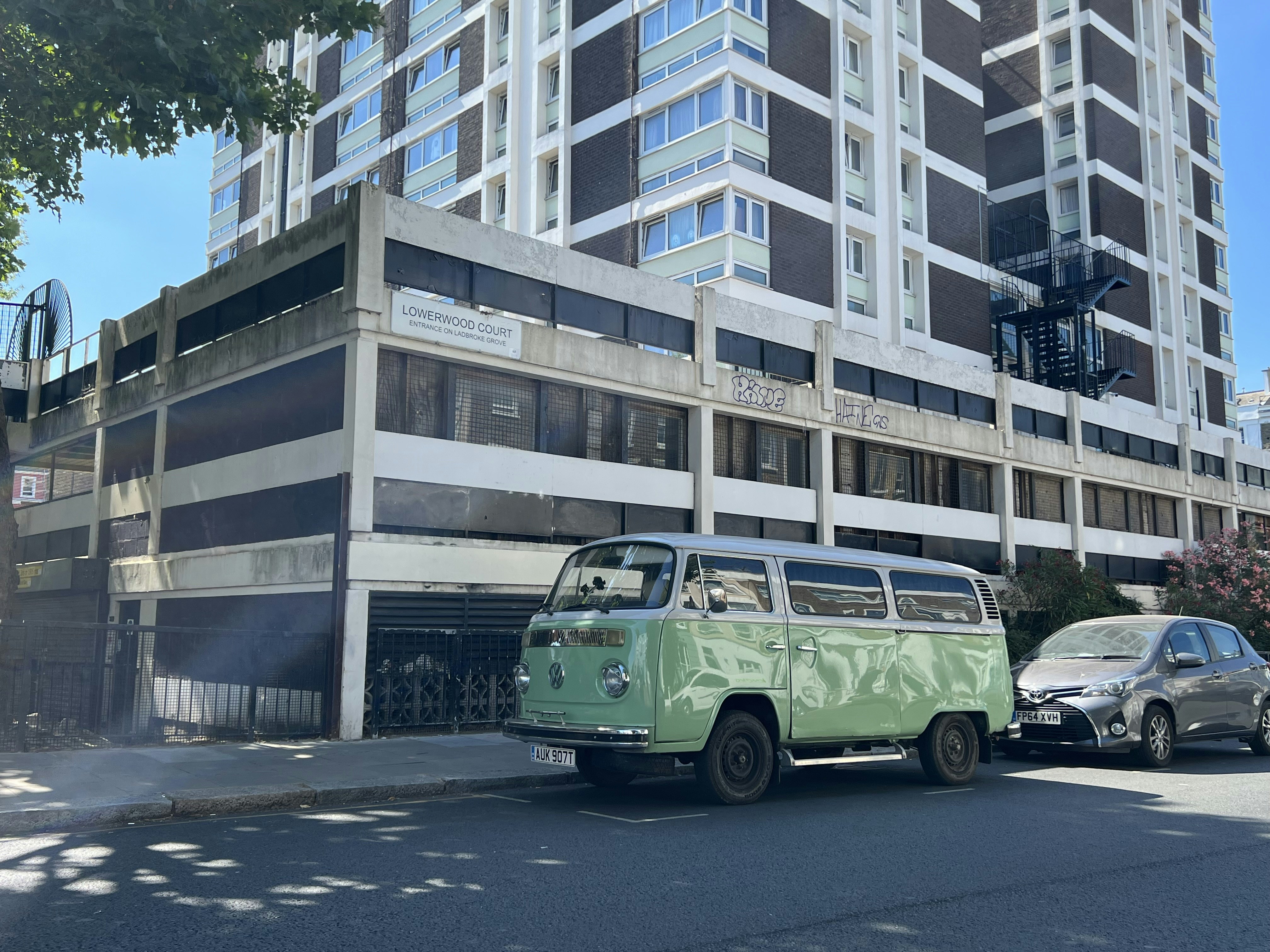 A green van parked in front of a building photo – Free Portobello road ...