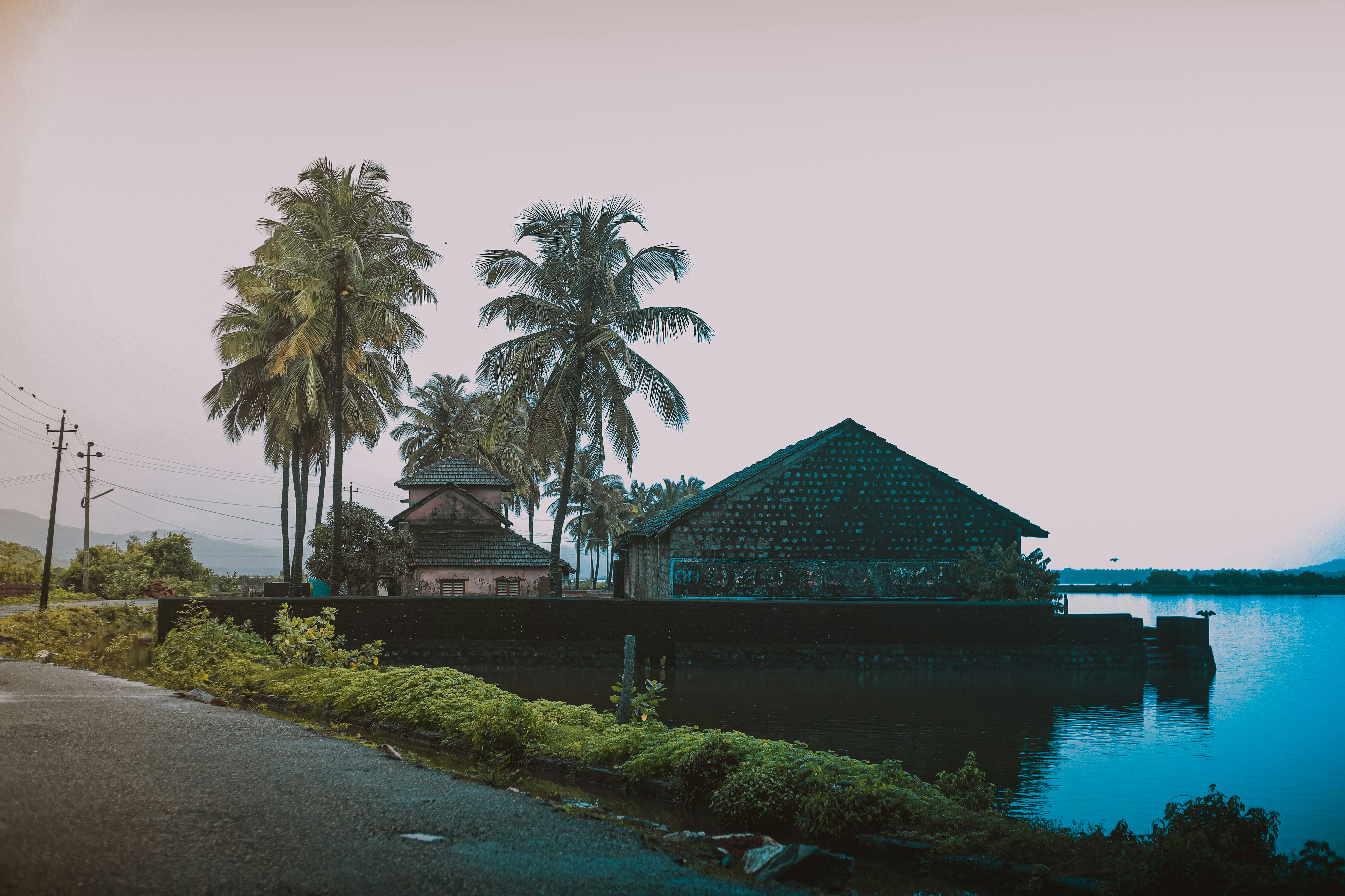 A building with a dome roof by a body of water photo – Free Nature ...
