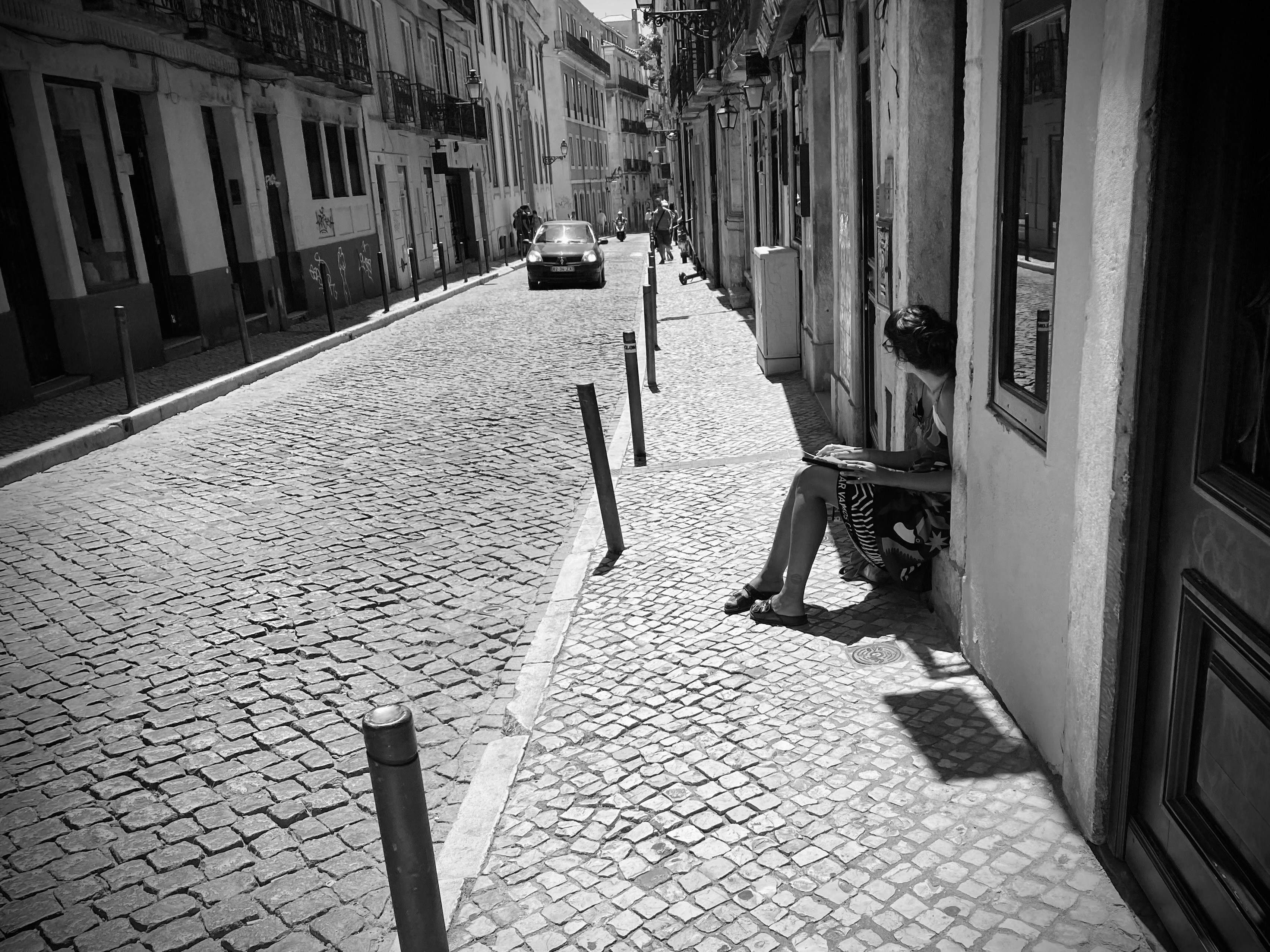 a person sitting on a bench
