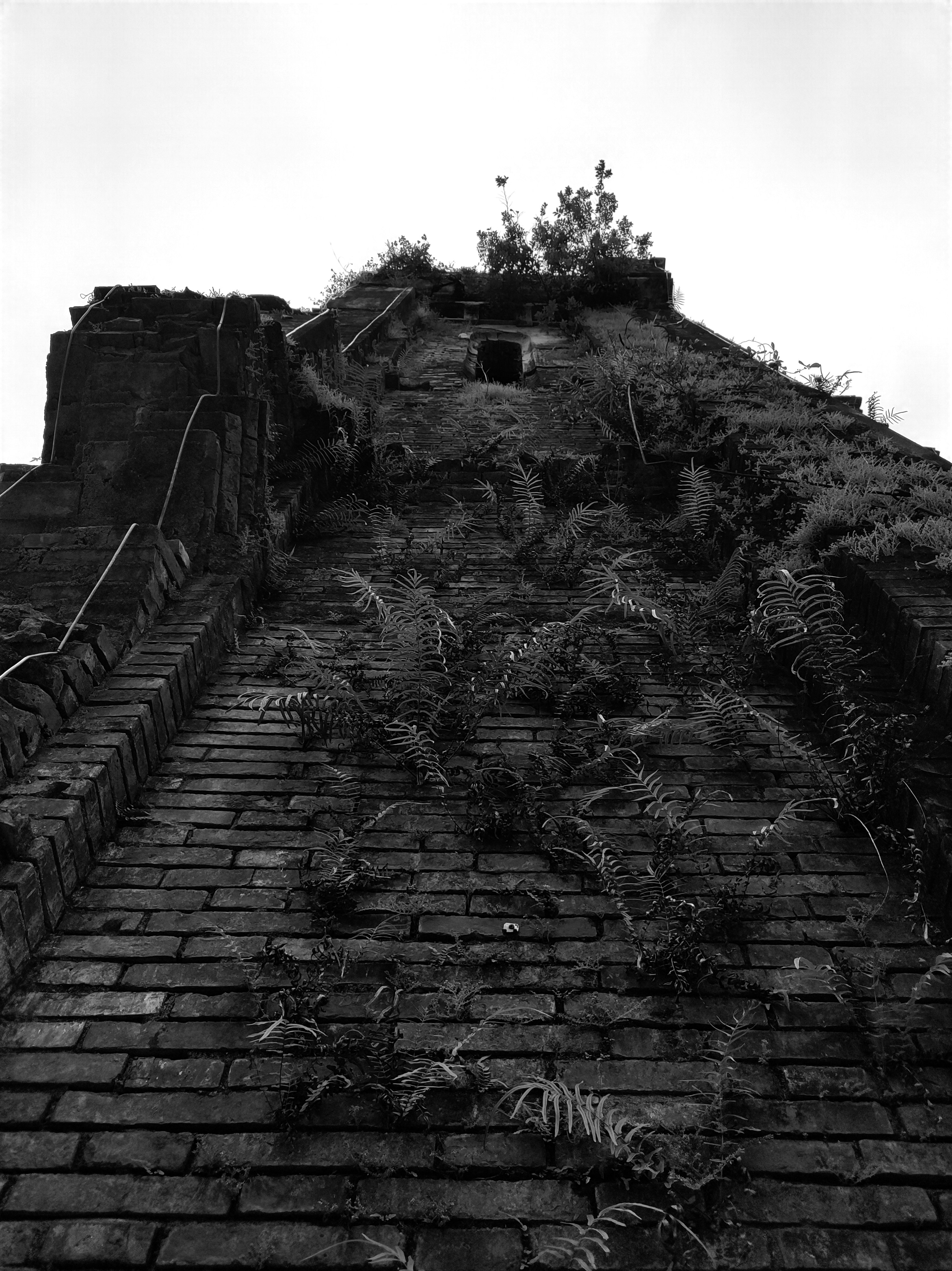 a stone wall with stairs