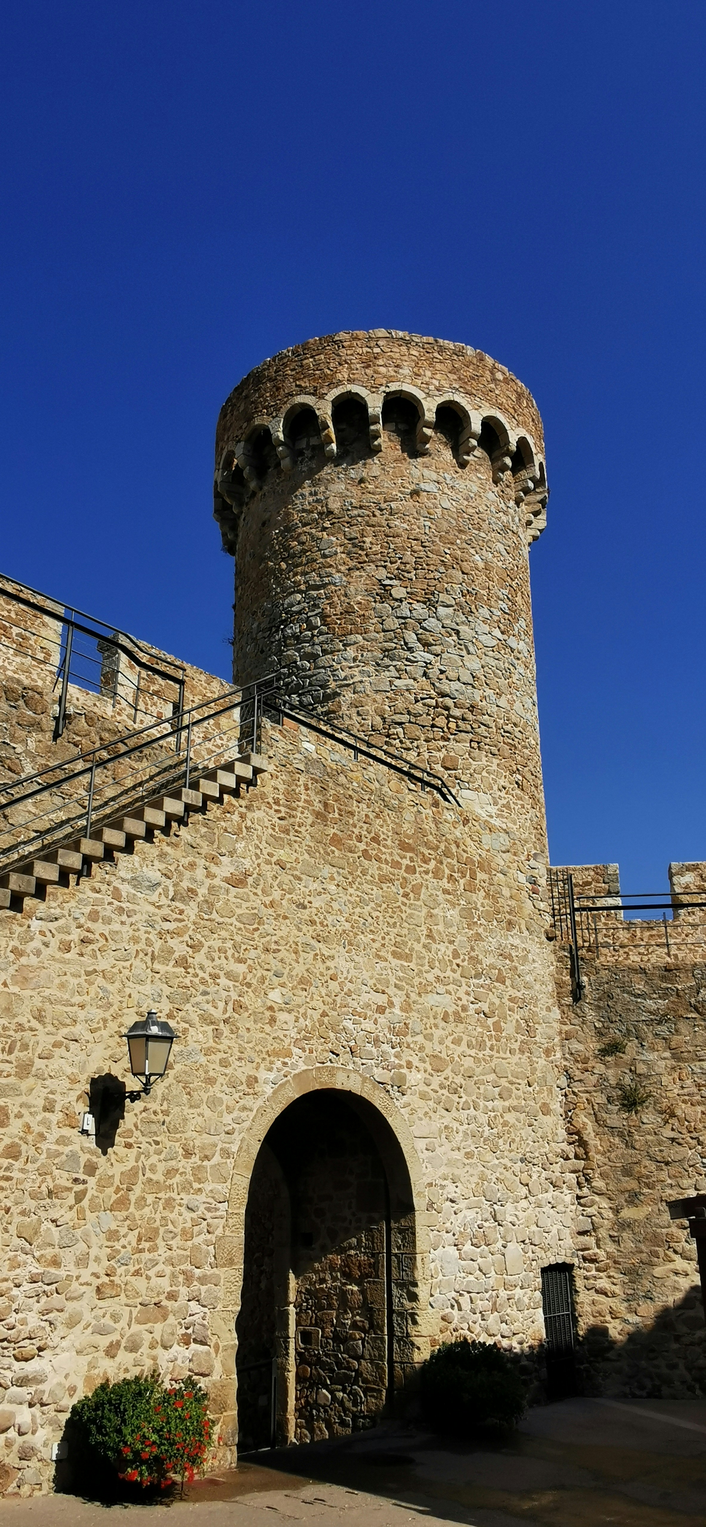 a stone building with a stone archway