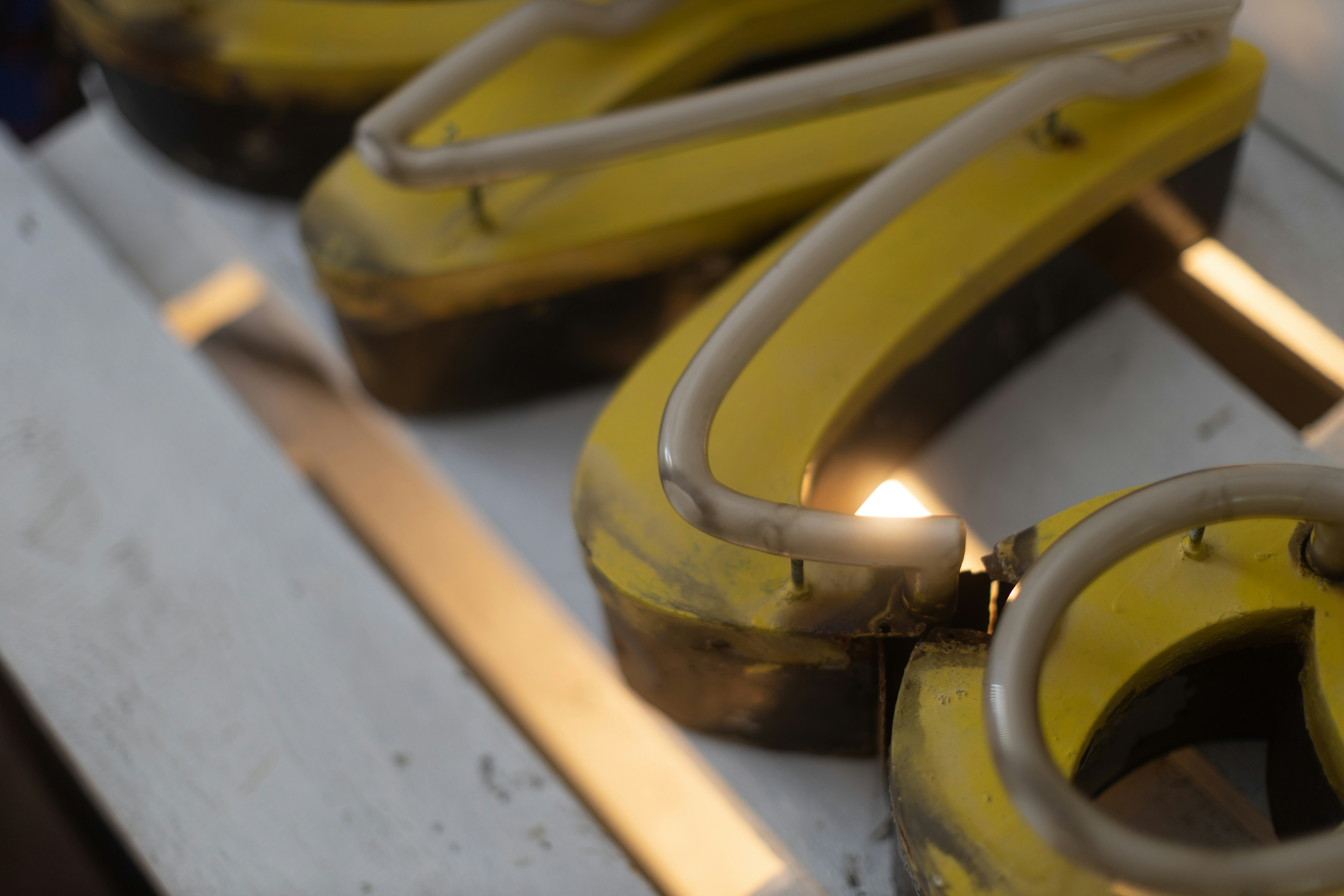 a close-up of several yellow pipes