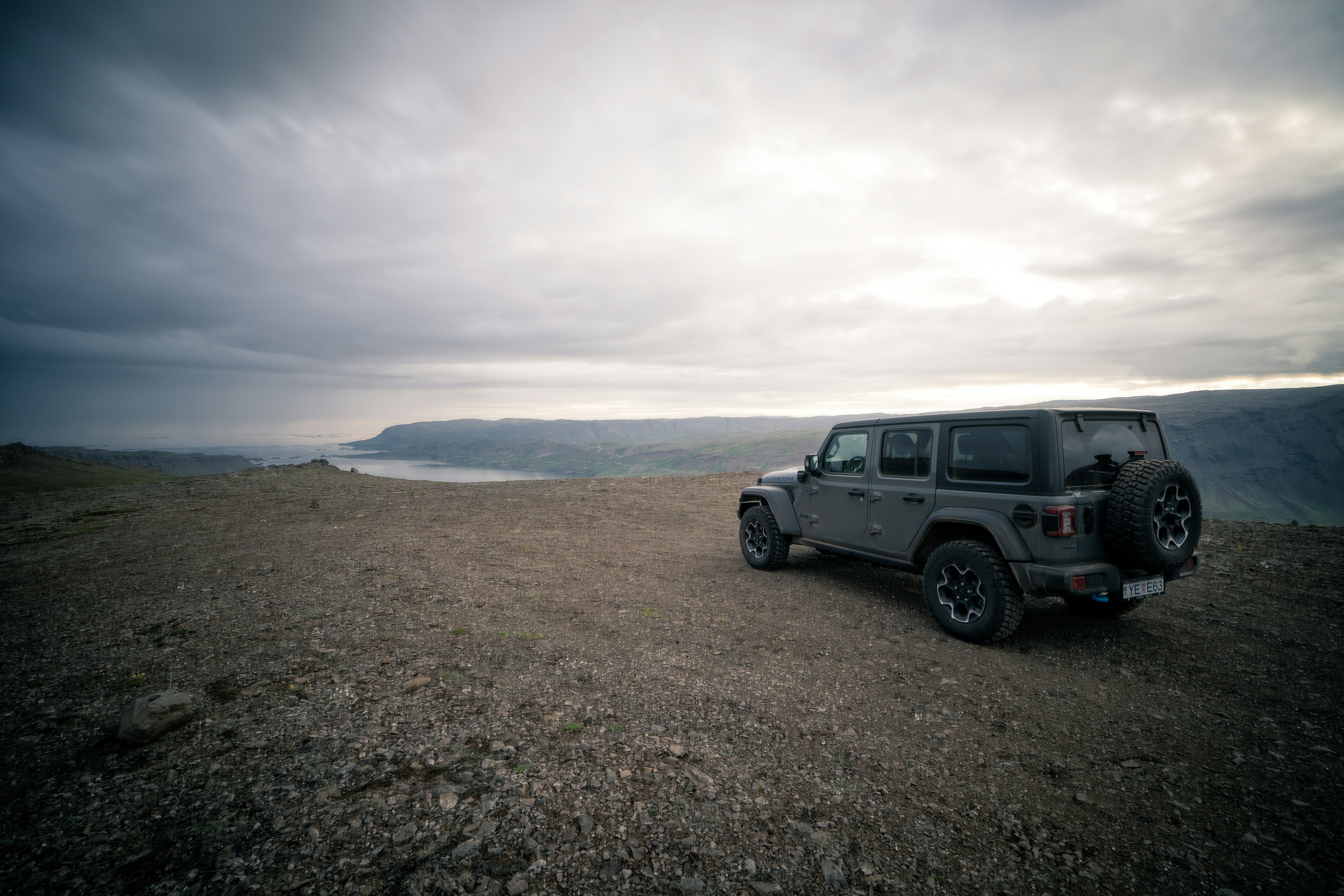 a car parked on a rocky surface