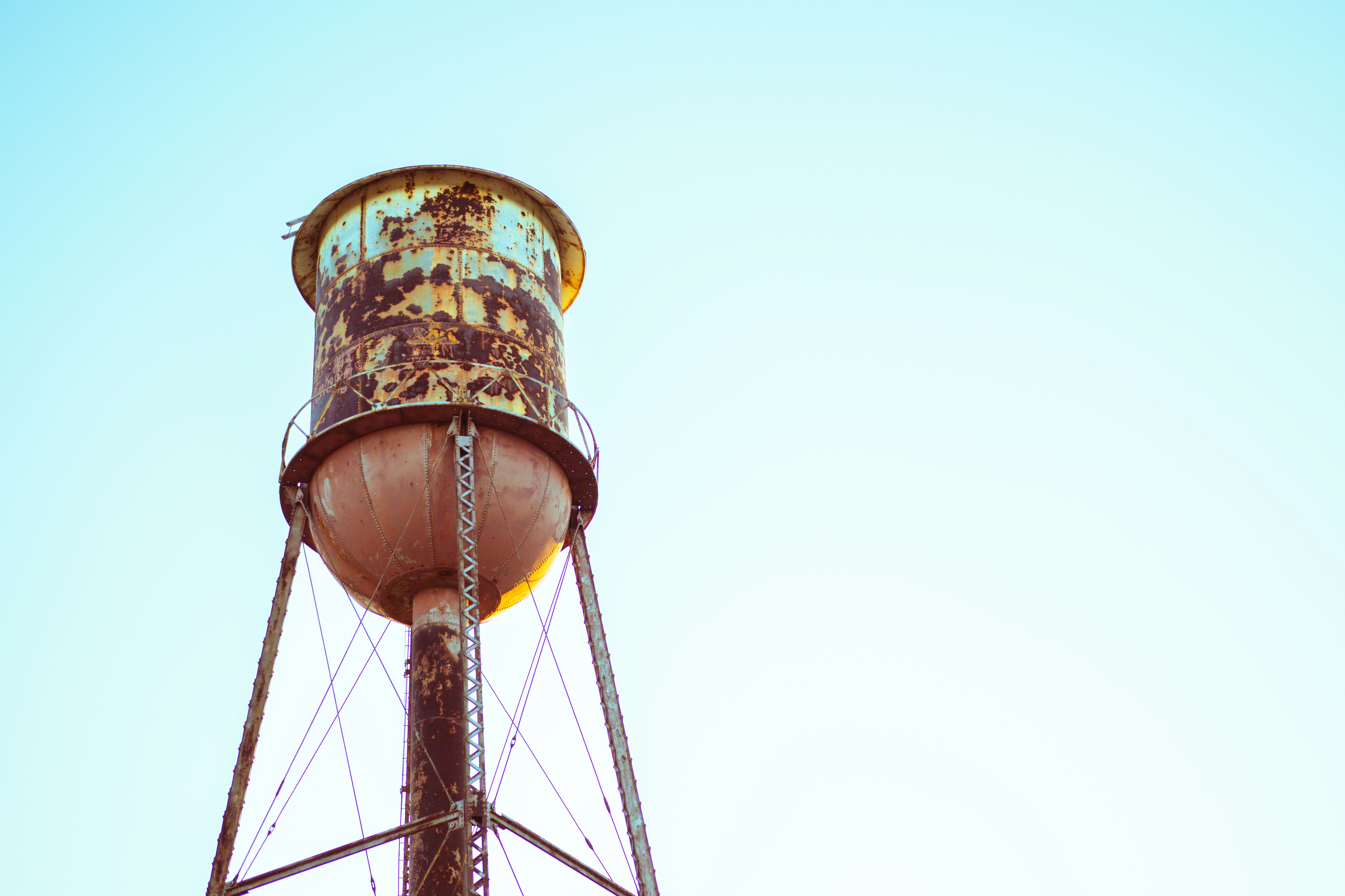 A water tower with a water tower photo – Free Water tower Image on Unsplash