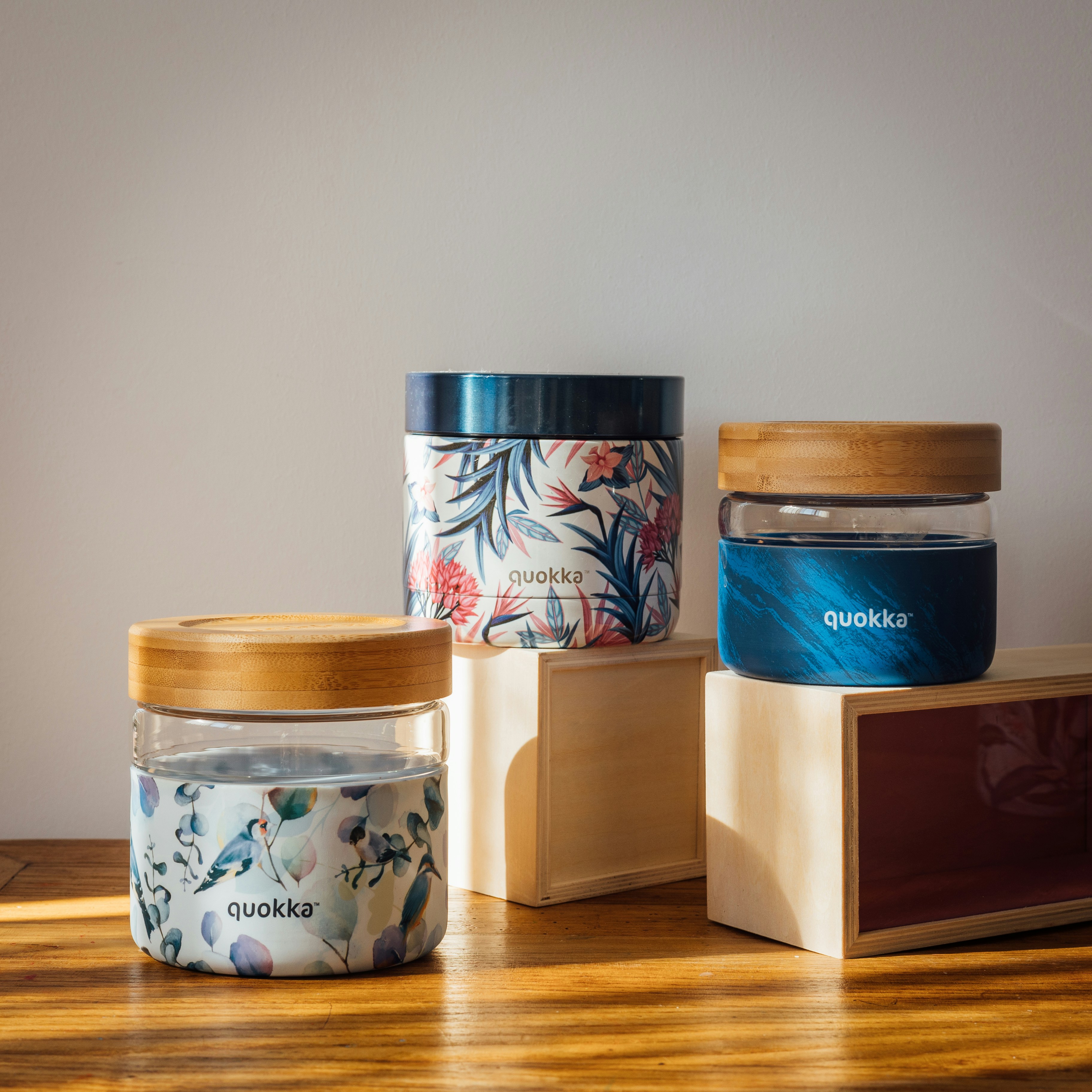 Sunlit Floral Jars on Wooden Blocks: A Quiet Studio Still-Life