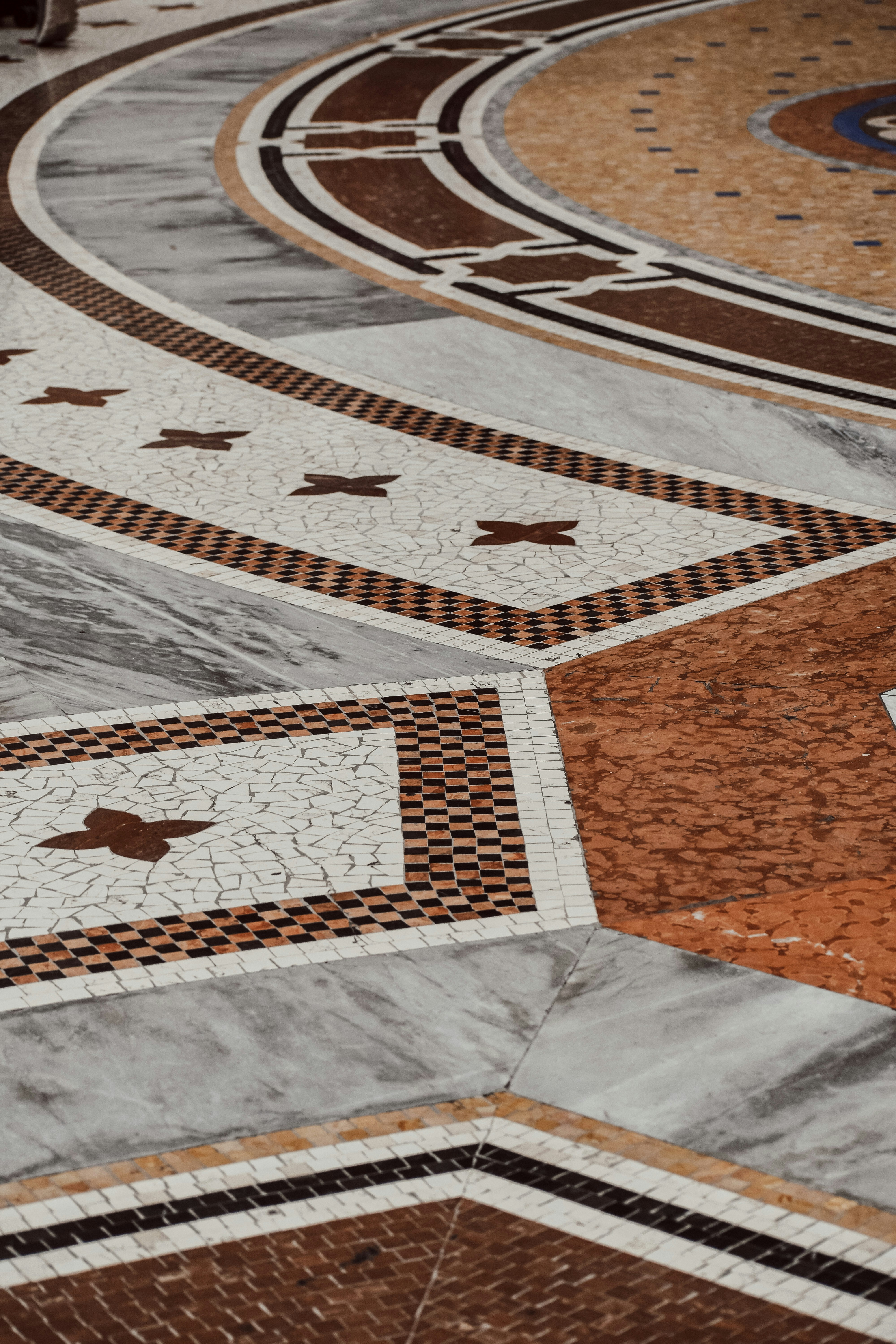 Mosaic Circles: A Geometric Flight Over Patterned Marble