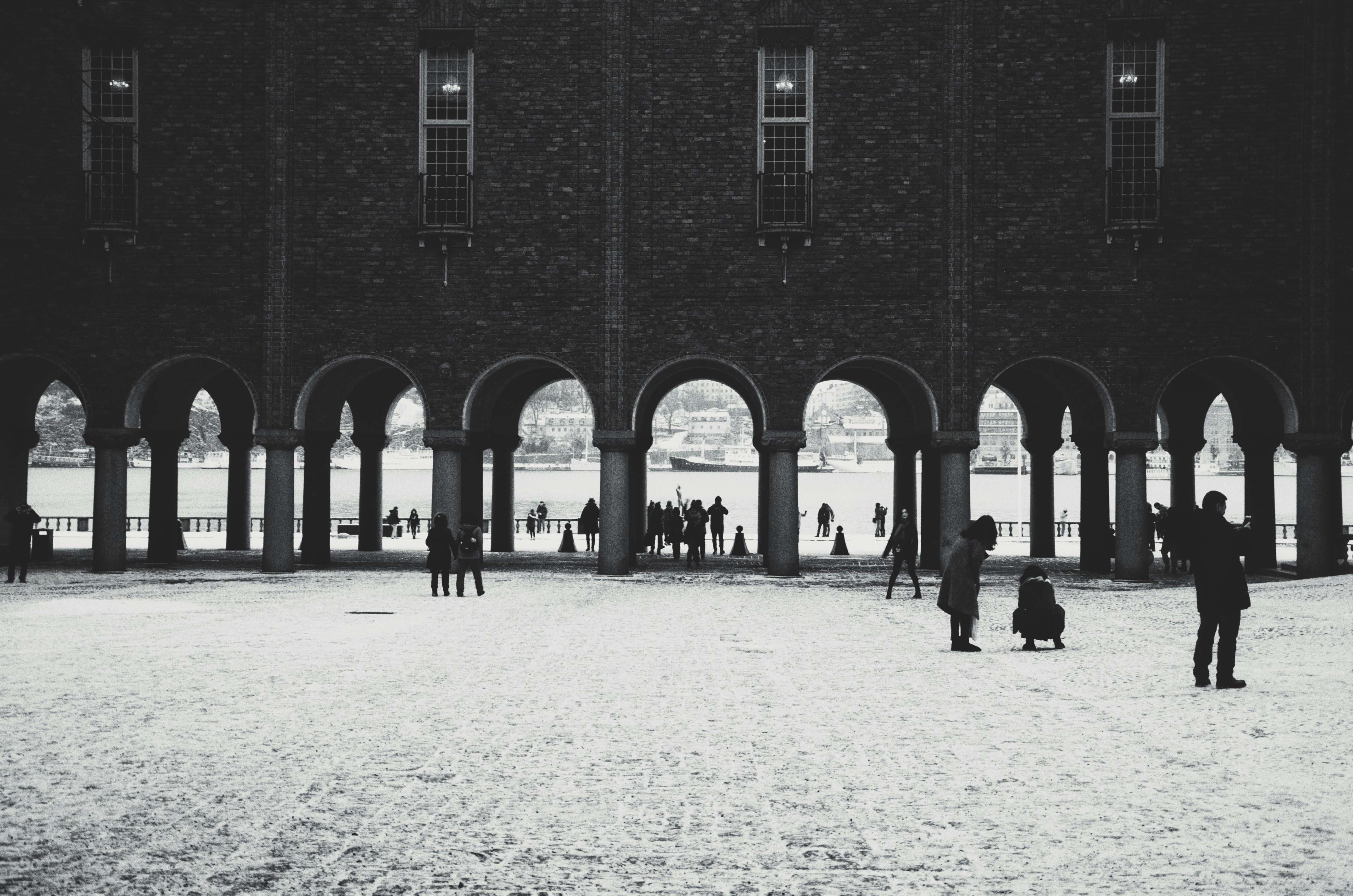 Arcade of Quiet Snow: People beneath the Pier