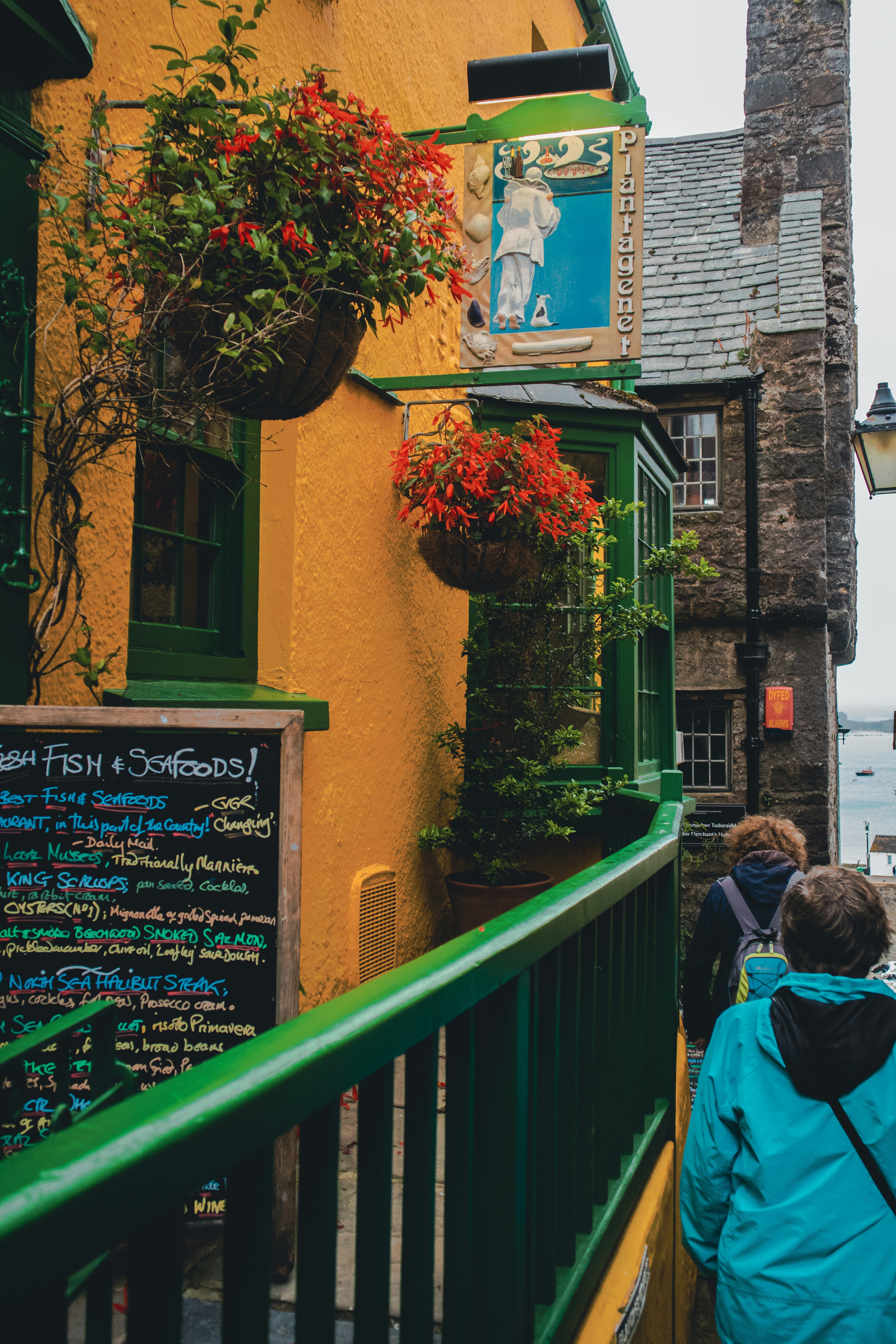 A sign on a building photo – Free Tenby Image on Unsplash