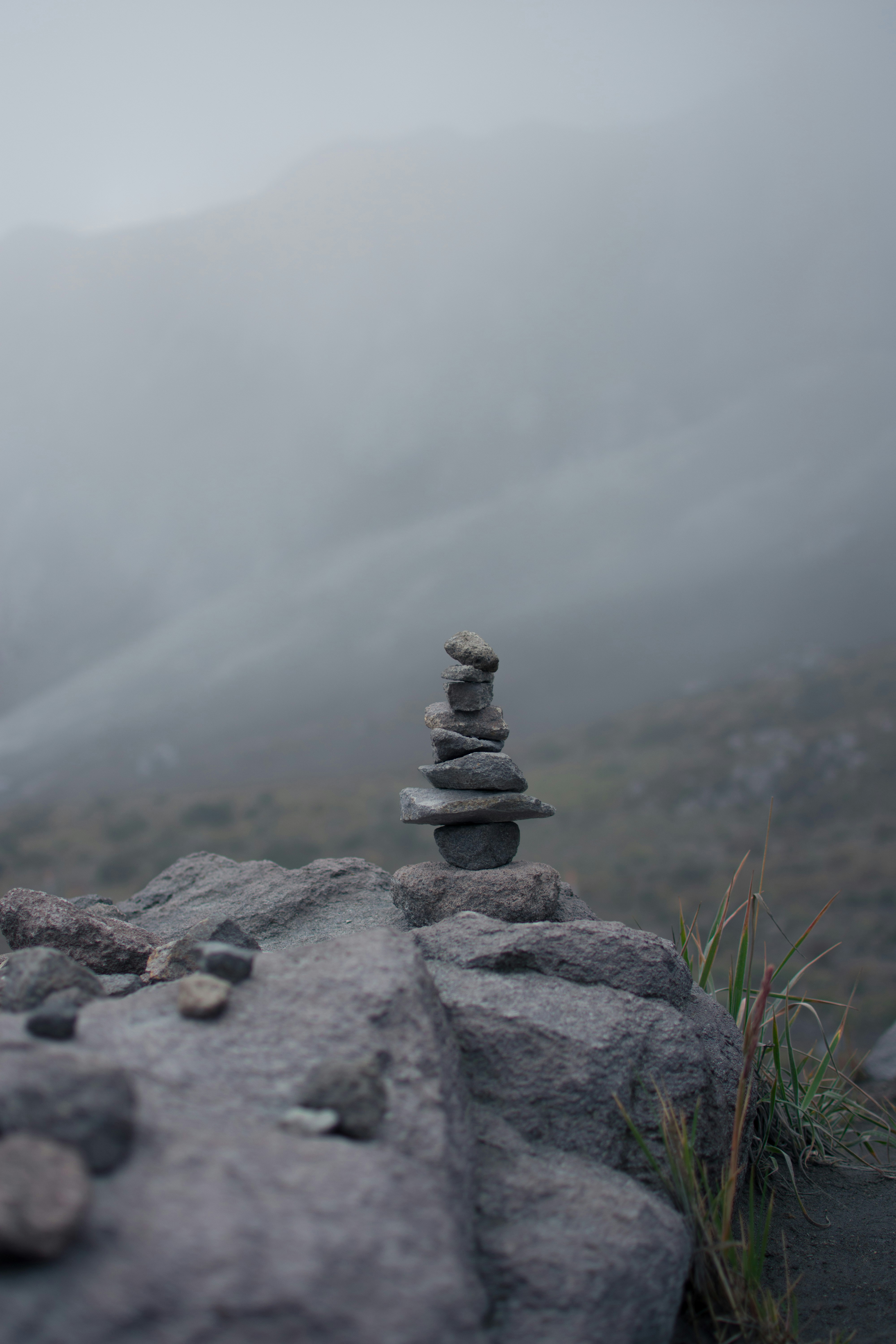 A stack of rocks on a mountain photo – Free Image on Unsplash