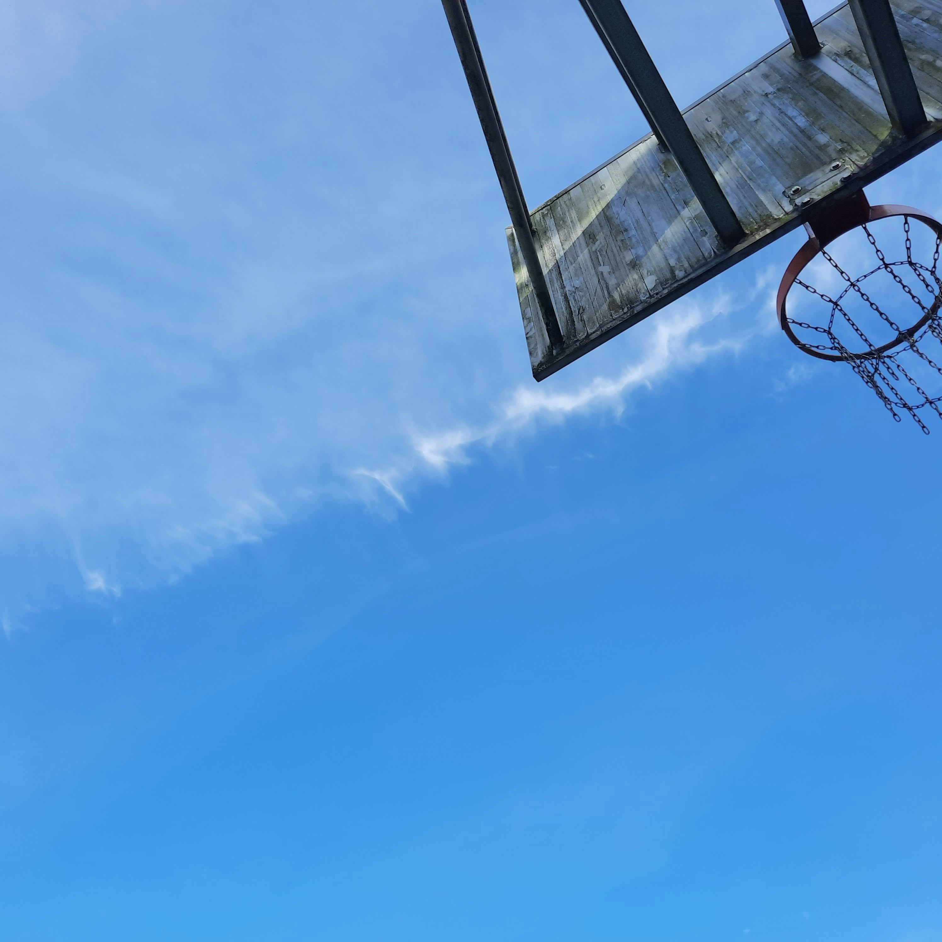 Rim and Sky: A Minimalist Moment Under Cerulean Blue