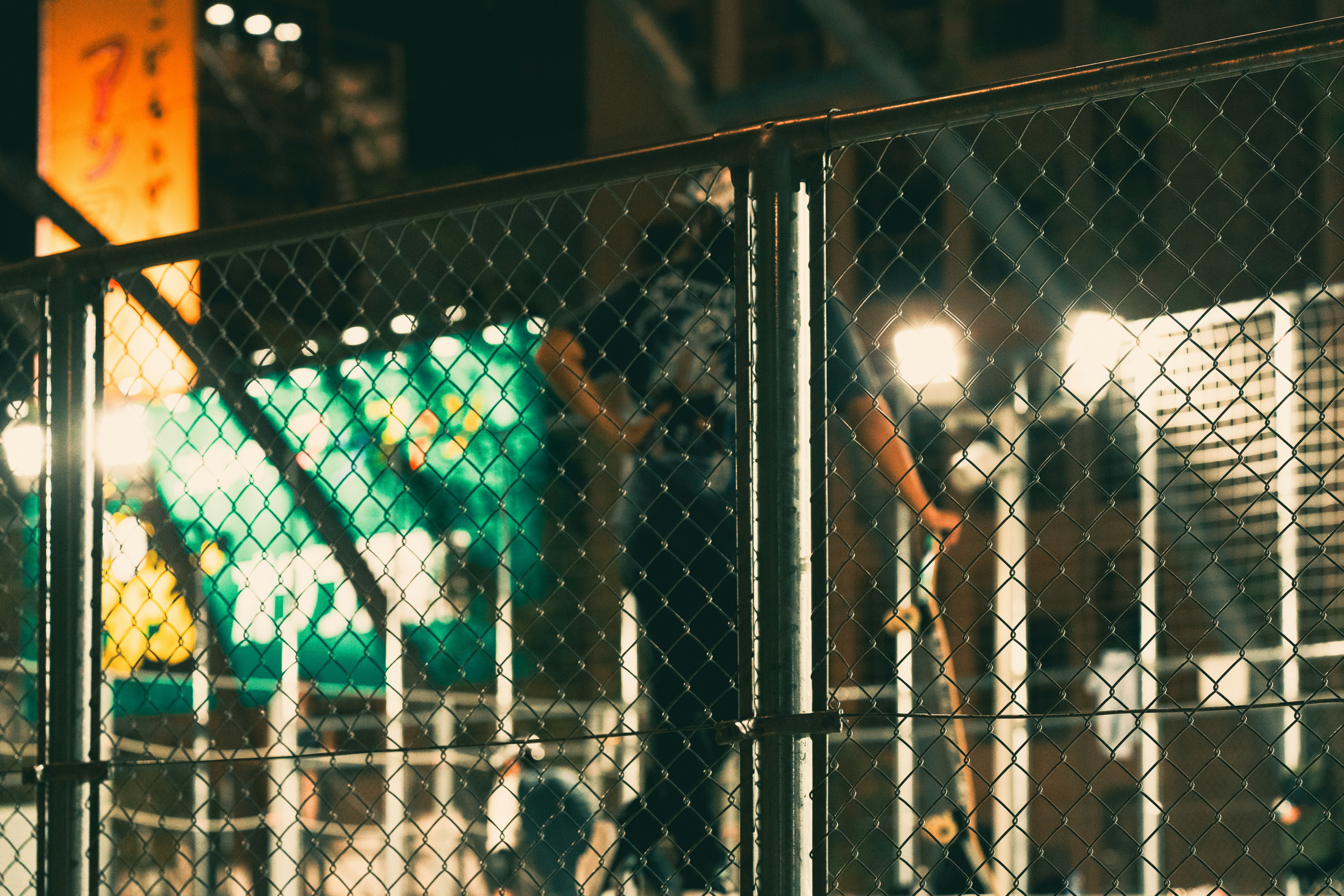A person behind a fence photo – Free Japan Image on Unsplash
