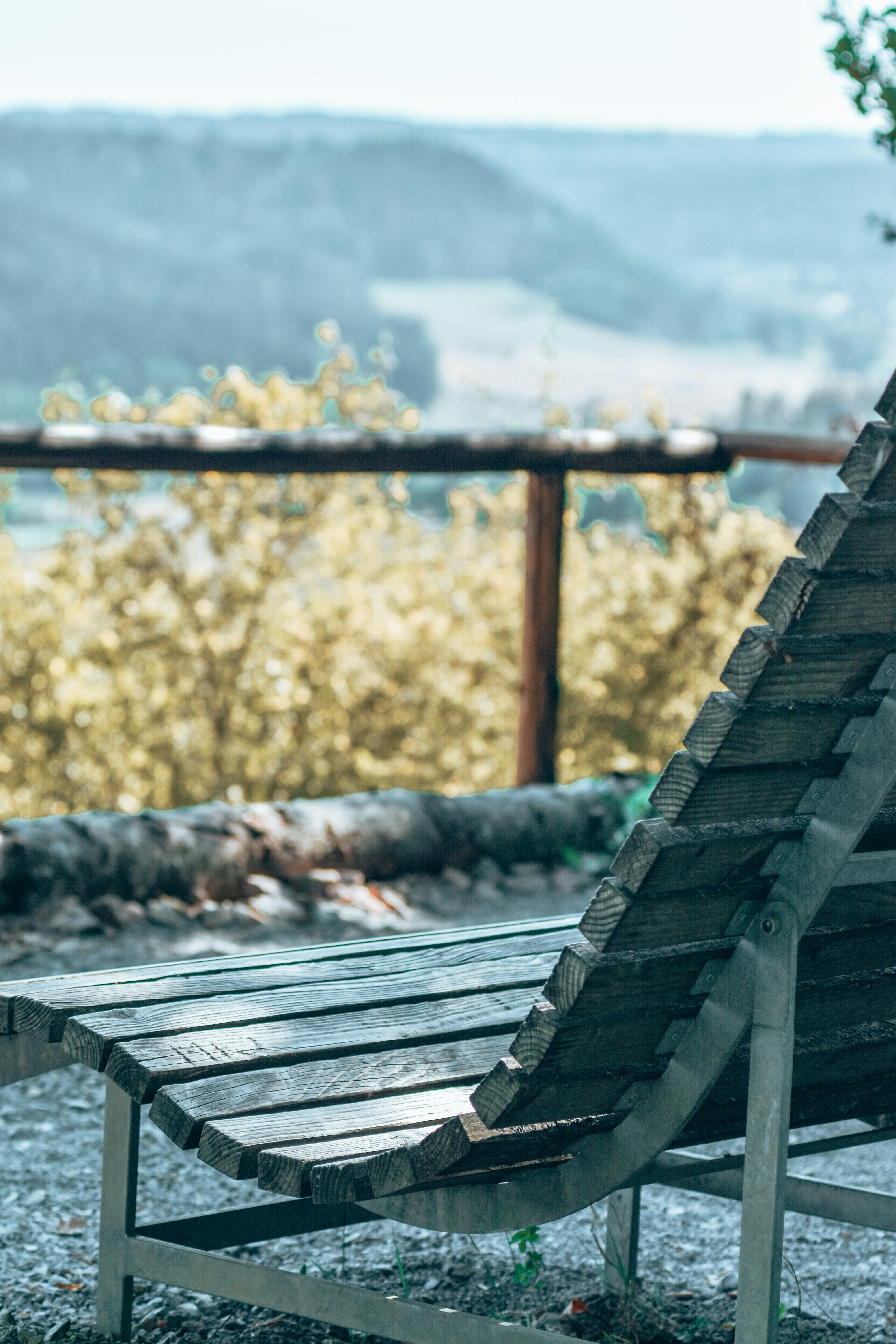 A bench overlooking a city photo – Free Stone Image on Unsplash