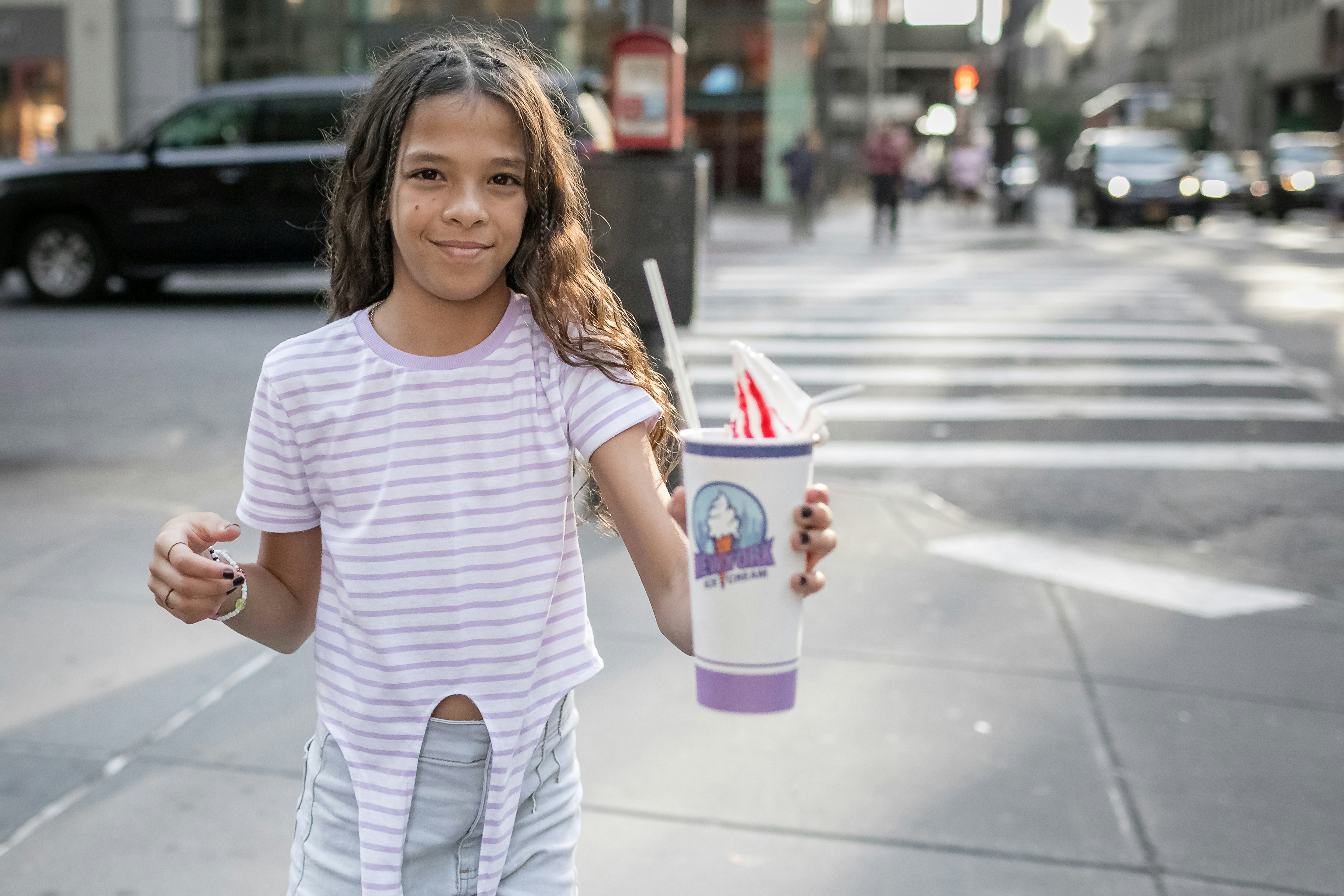 Cup in Hand, City in Focus