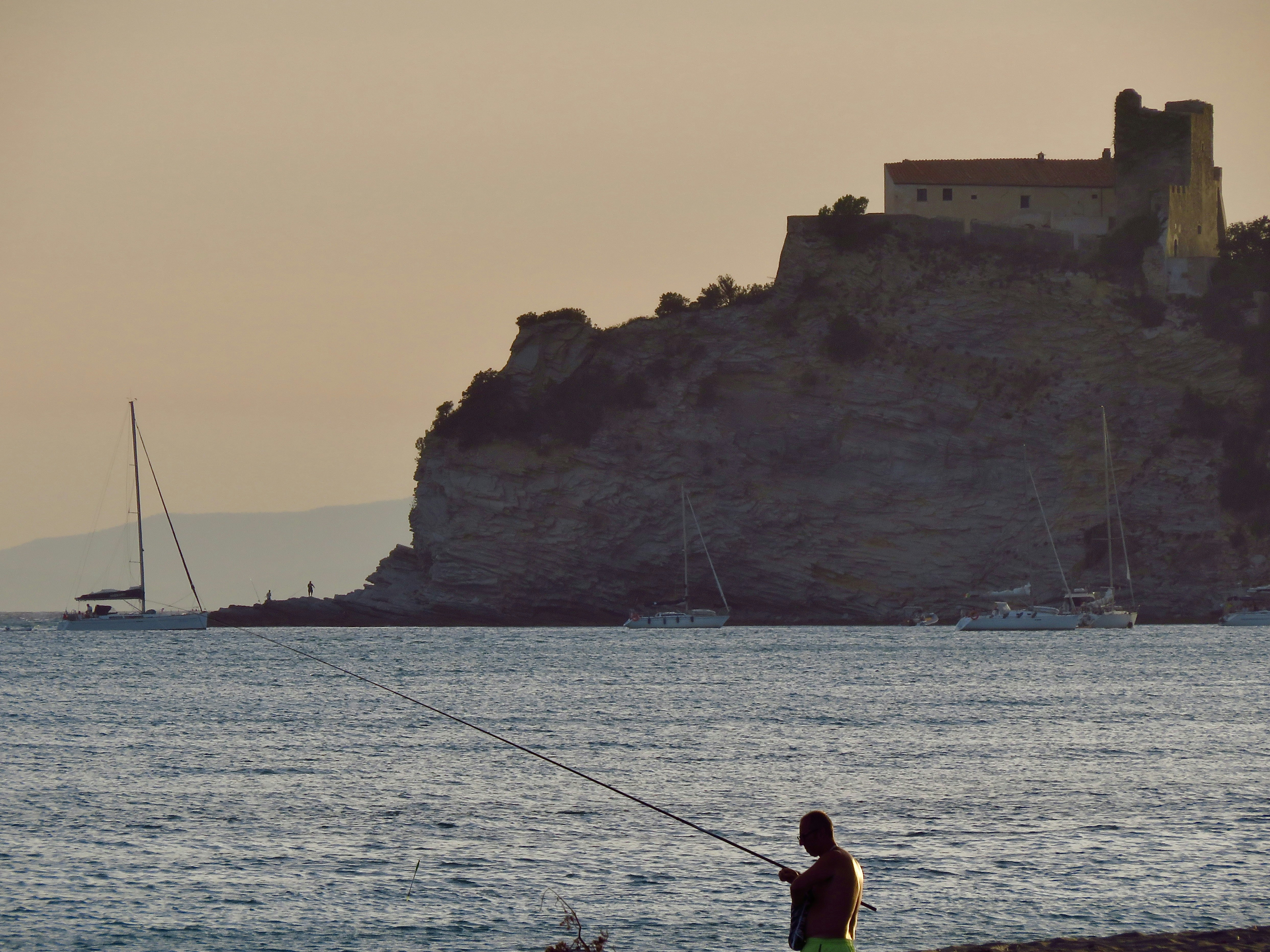 Evening Angler by the Fortress