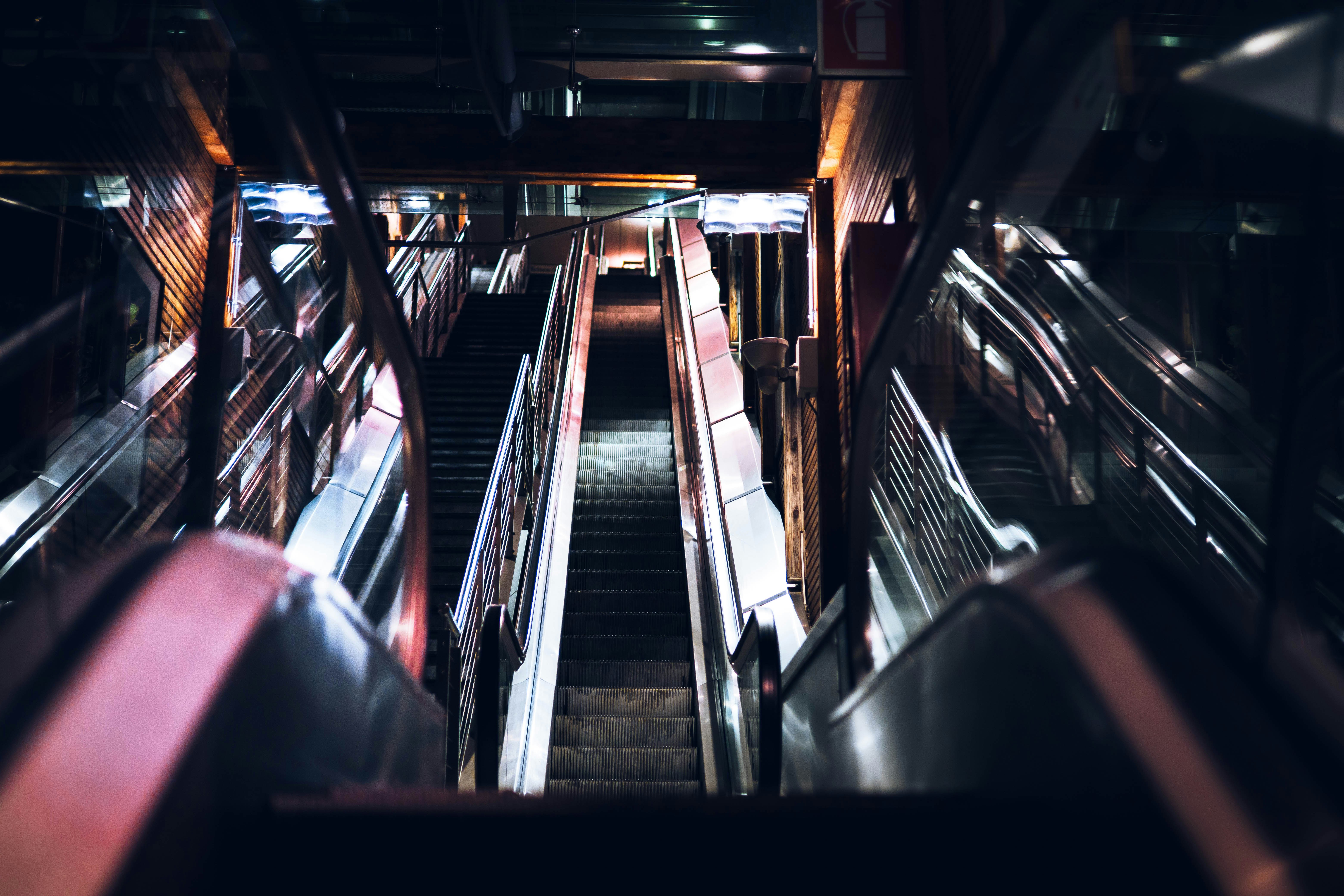 Vanishing Rails: A Moody Descent Through an Urban Escalator