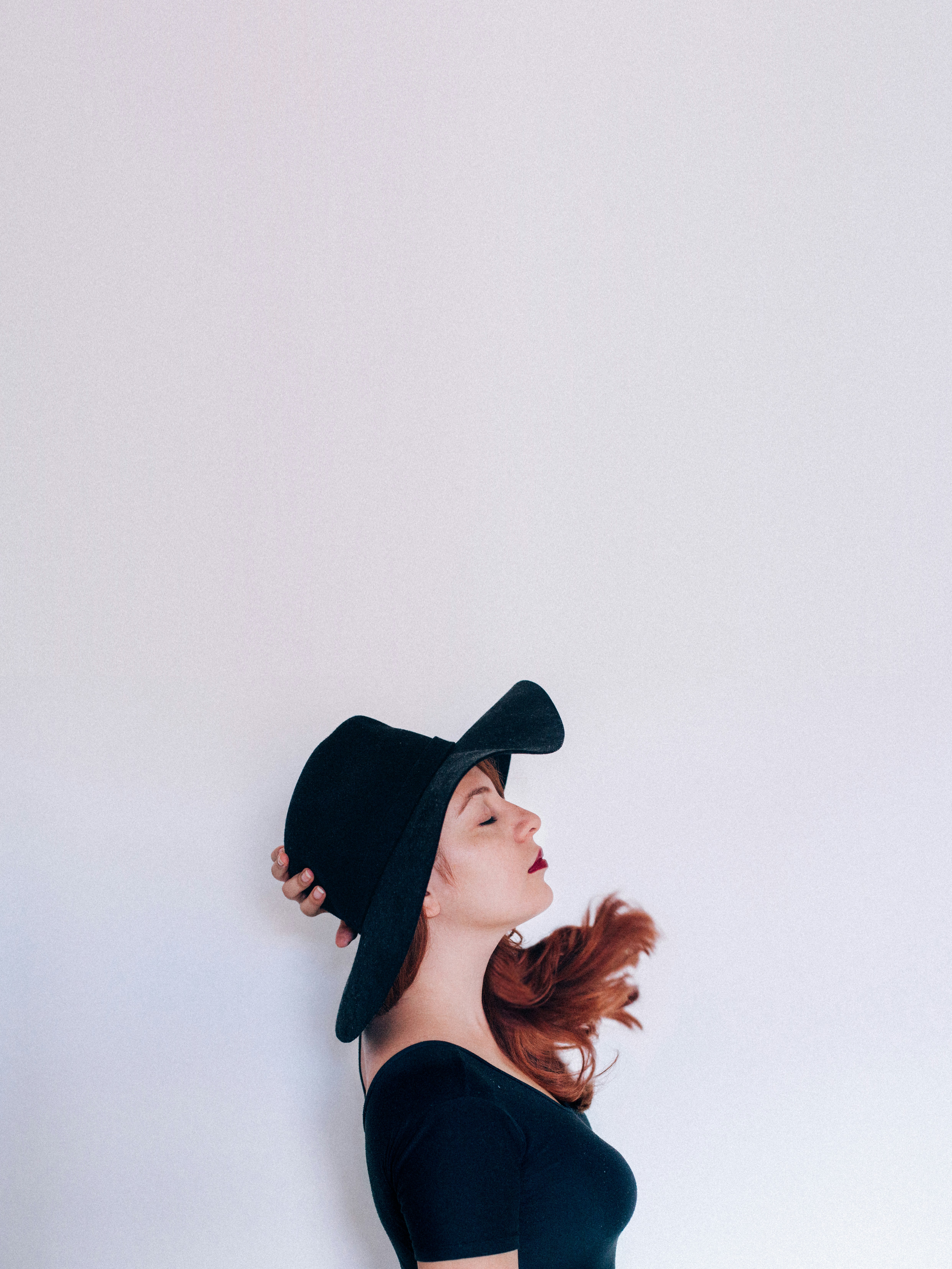 Quiet Grace in a Wide-Brim Fedora