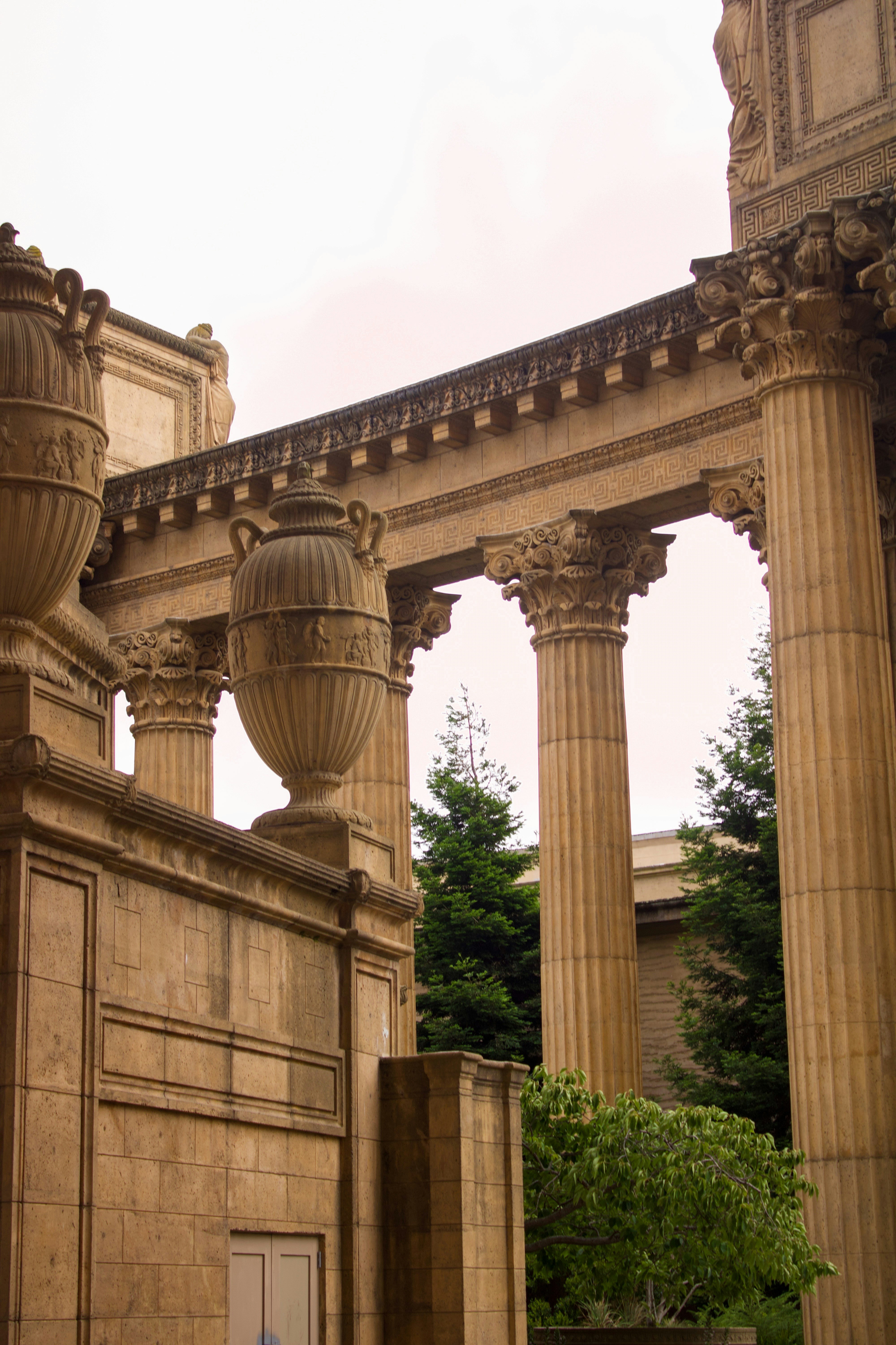 A building with pillars and a tree photo – Free Palace of fine arts ...