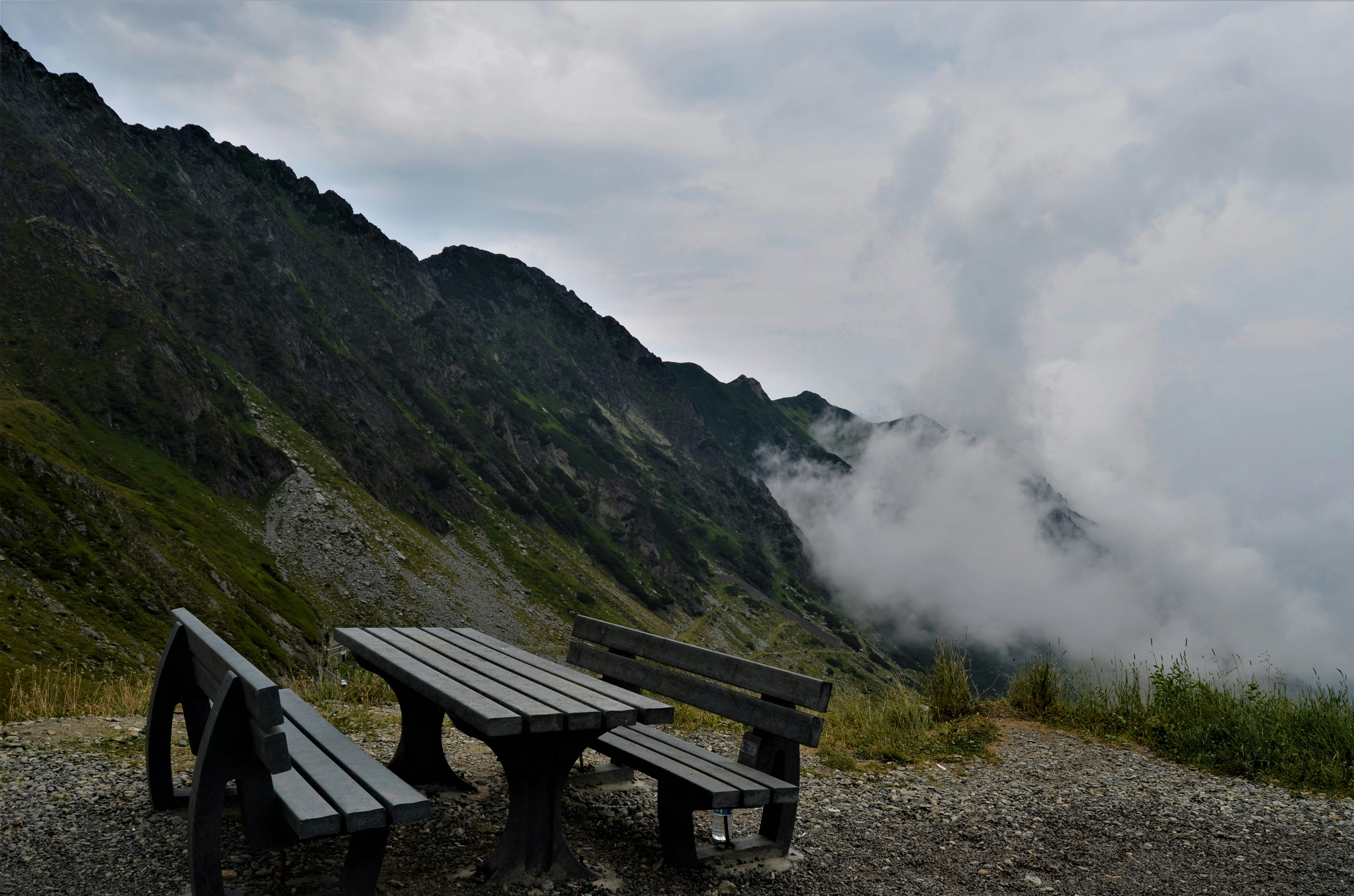 A group of benches sit unoccupied photo – Free Grey Image on Unsplash