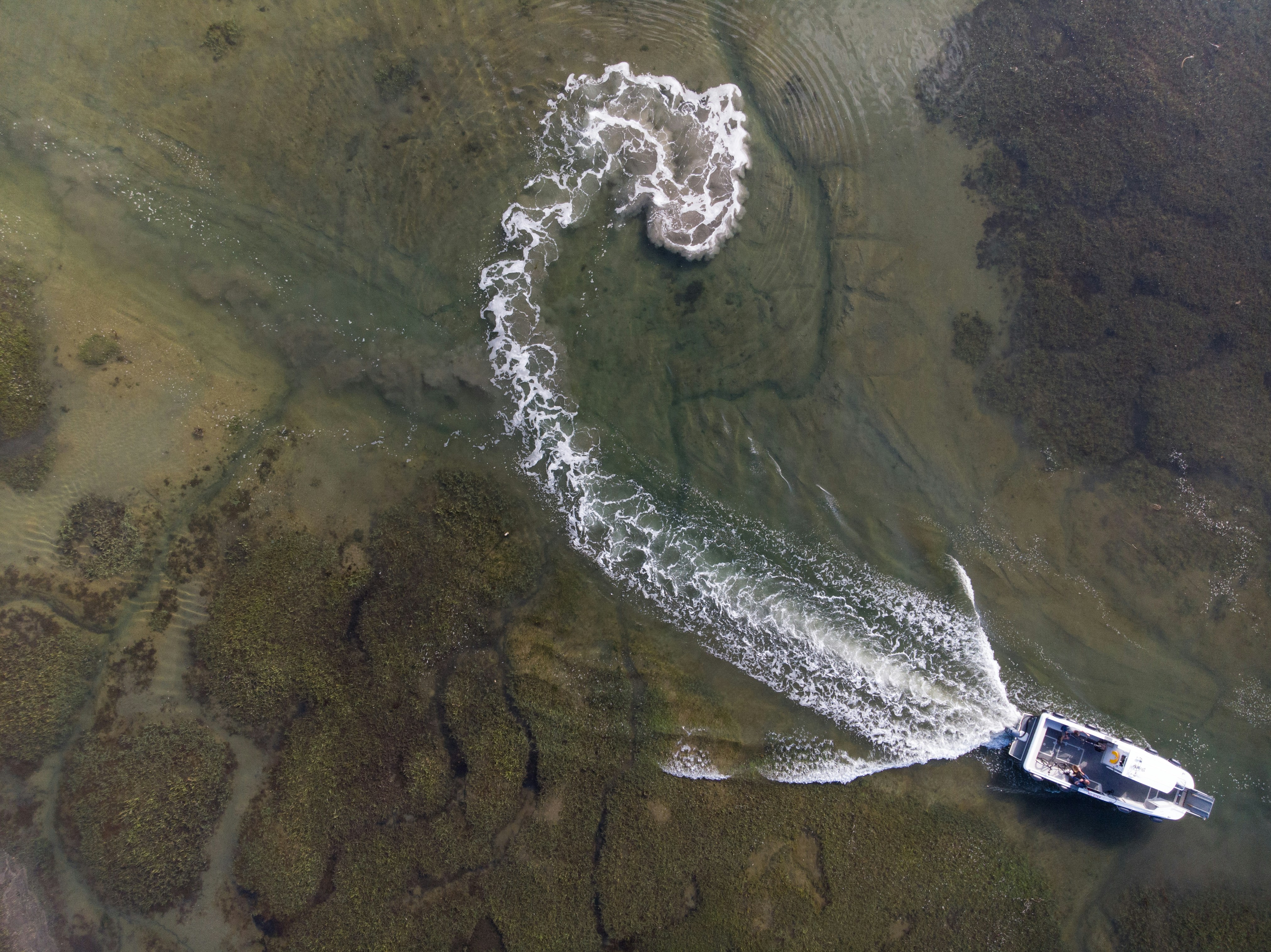 Coastal Wake: Aerial Turn by a Small Vessel