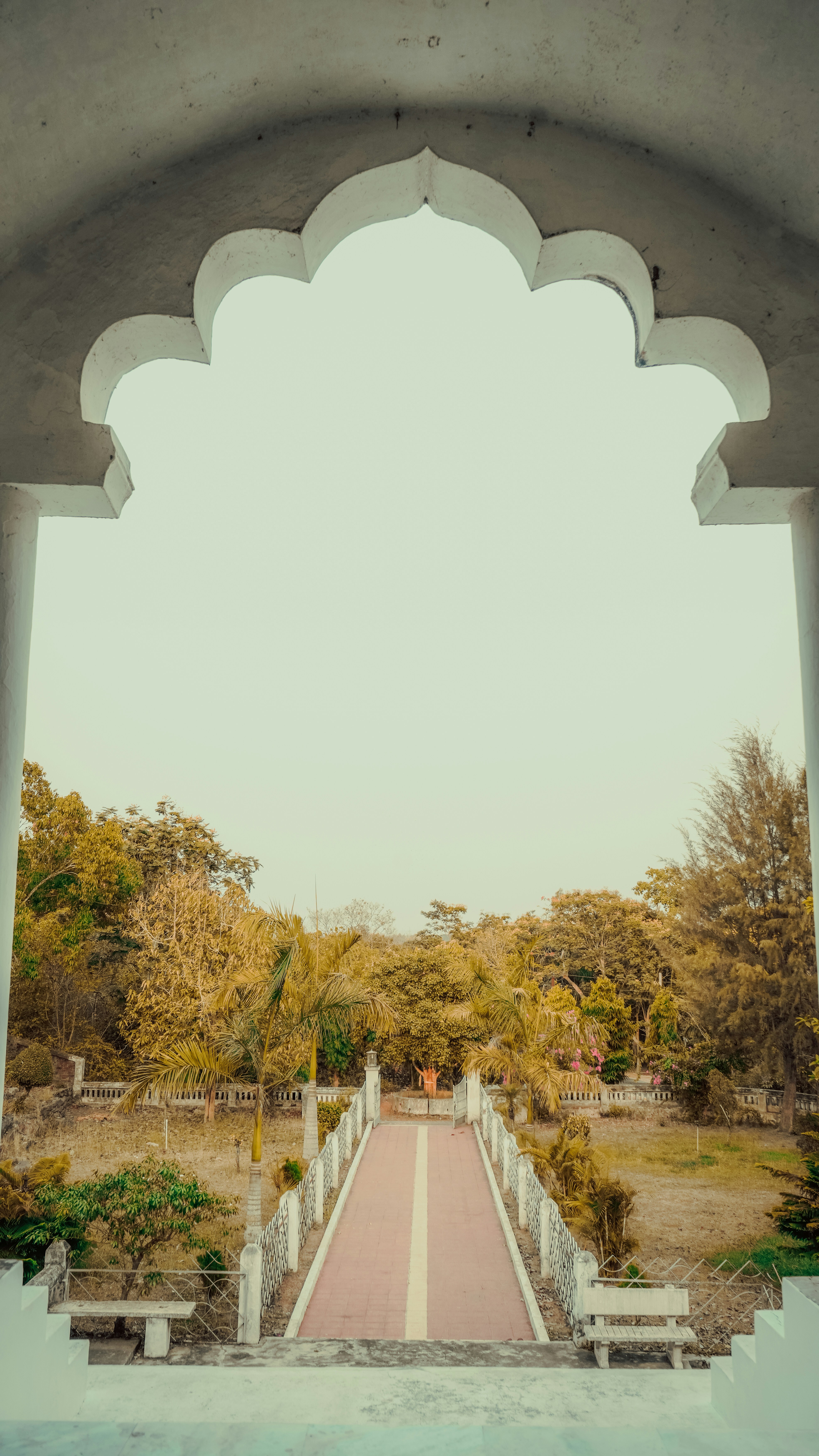 Archway Corridor: A Quiet Symmetry Along the Path to the Garden
